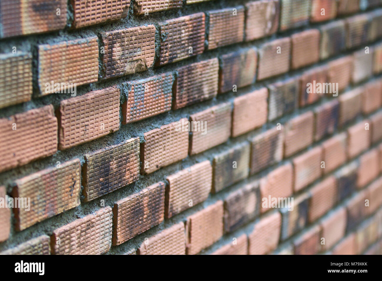 Brick masonry of red brick with a binder solution Stock Photo - Alamy