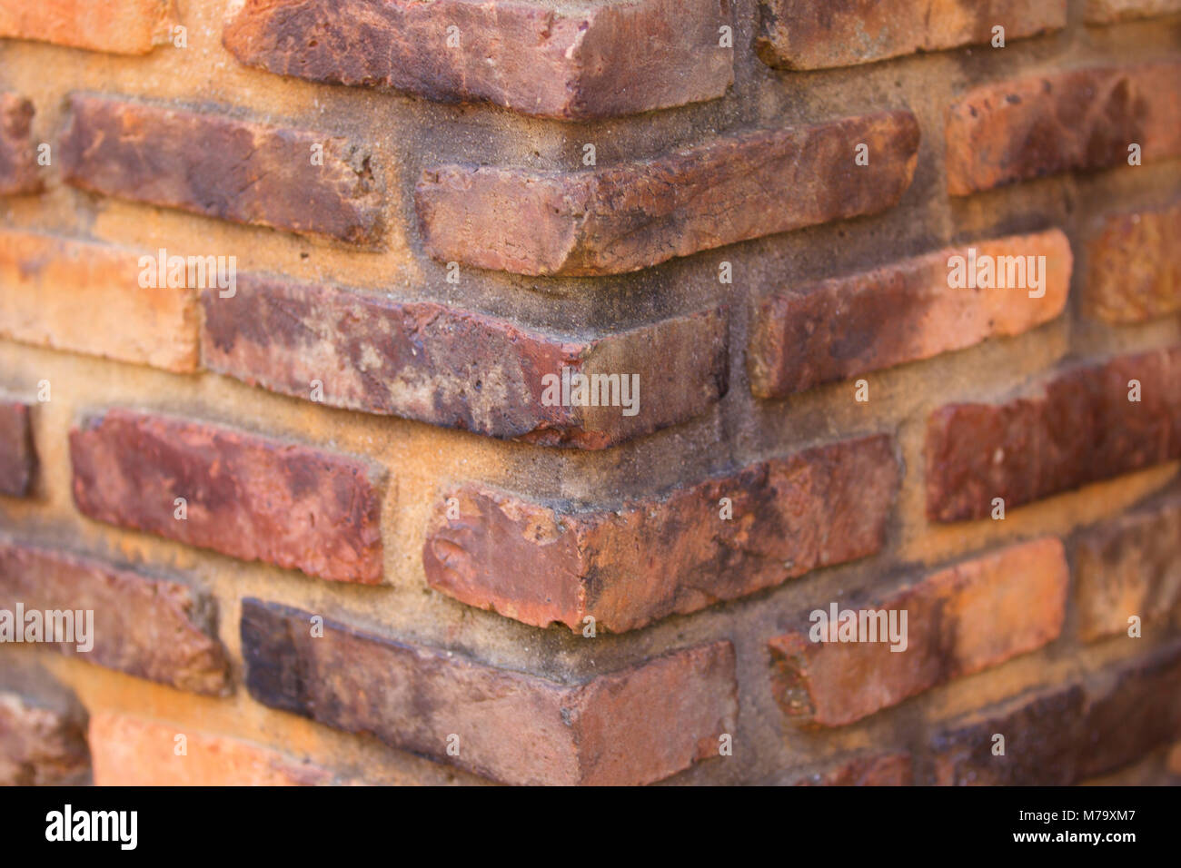 Brick masonry of red brick with a binder solution Stock Photo - Alamy
