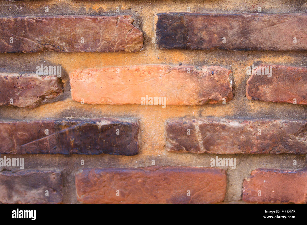 Brick masonry of red brick with a binder solution Stock Photo - Alamy