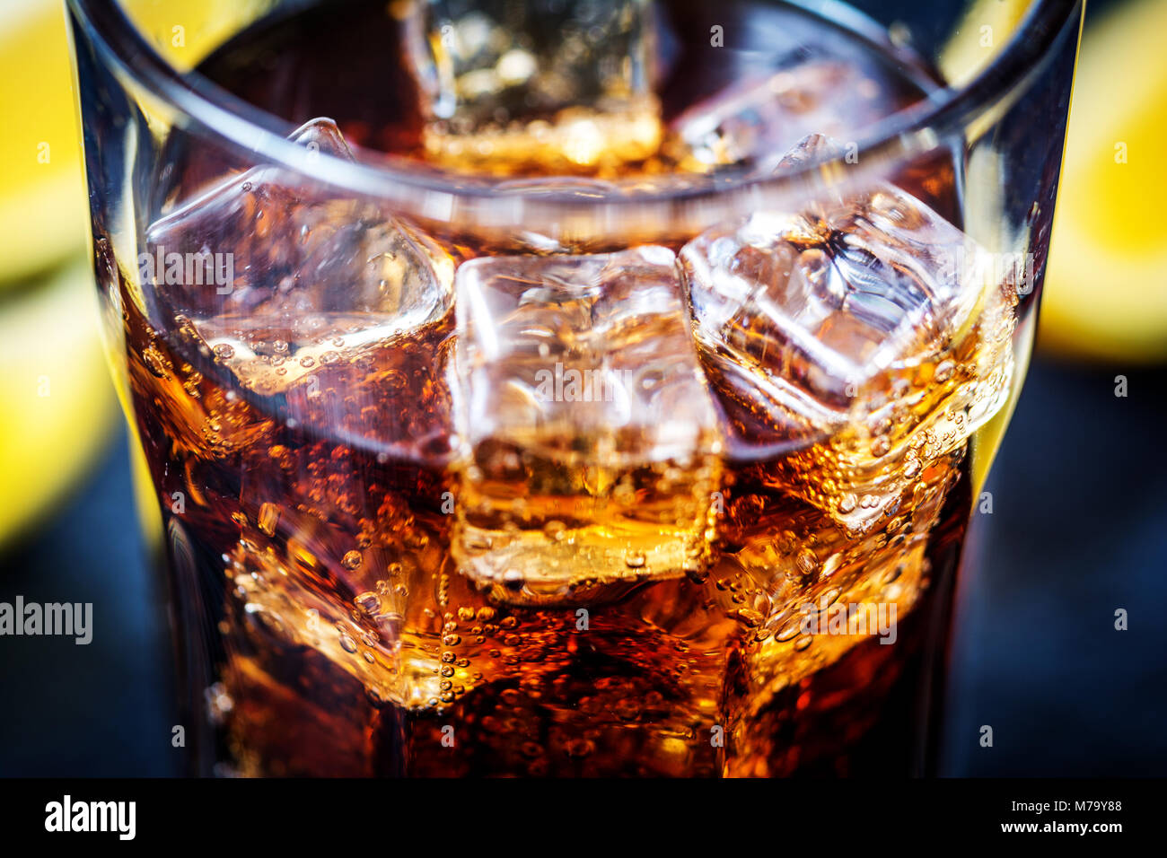 Cold cola drink with bubbles and ice cubes Stock Photo - Alamy
