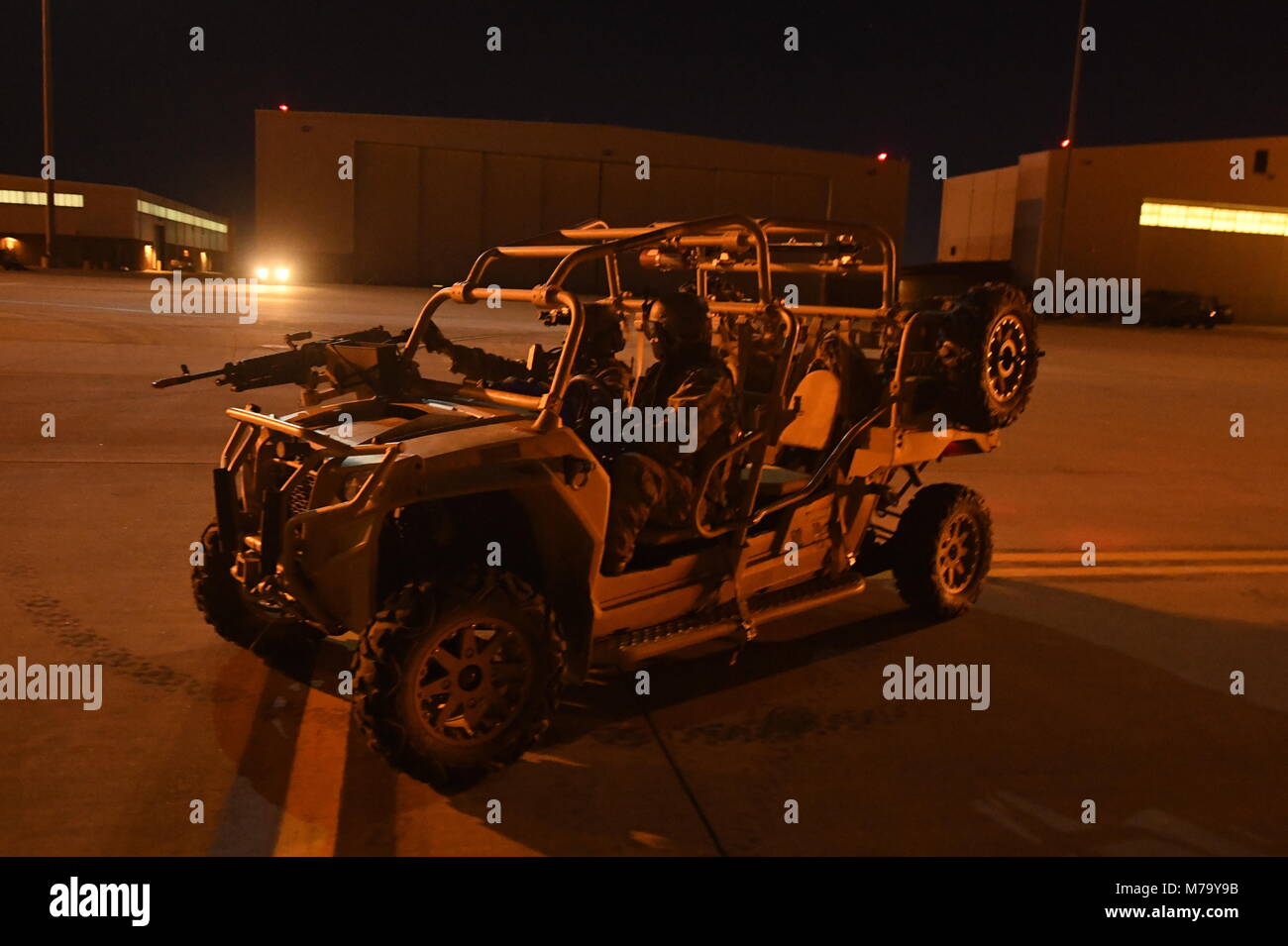 U.S. Army Special Operations Soldiers load tactical vehicles onto a U.S ...