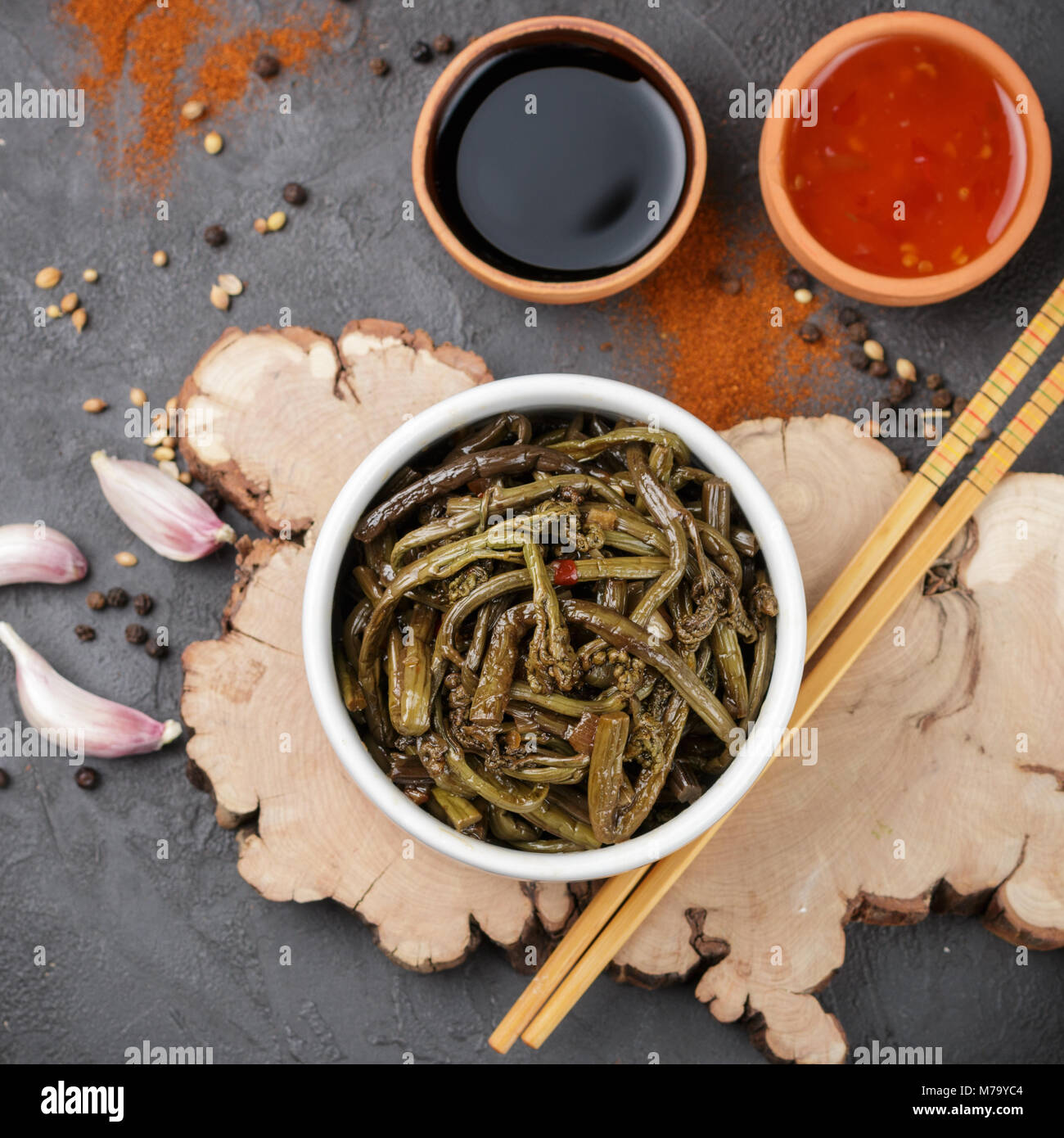 Spicy salad of fern with onion, garlic, soy sauce and spices. Dish ...