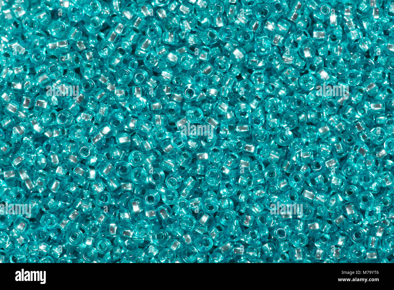 Many turquoise blue color glass beads Stock Photo - Alamy
