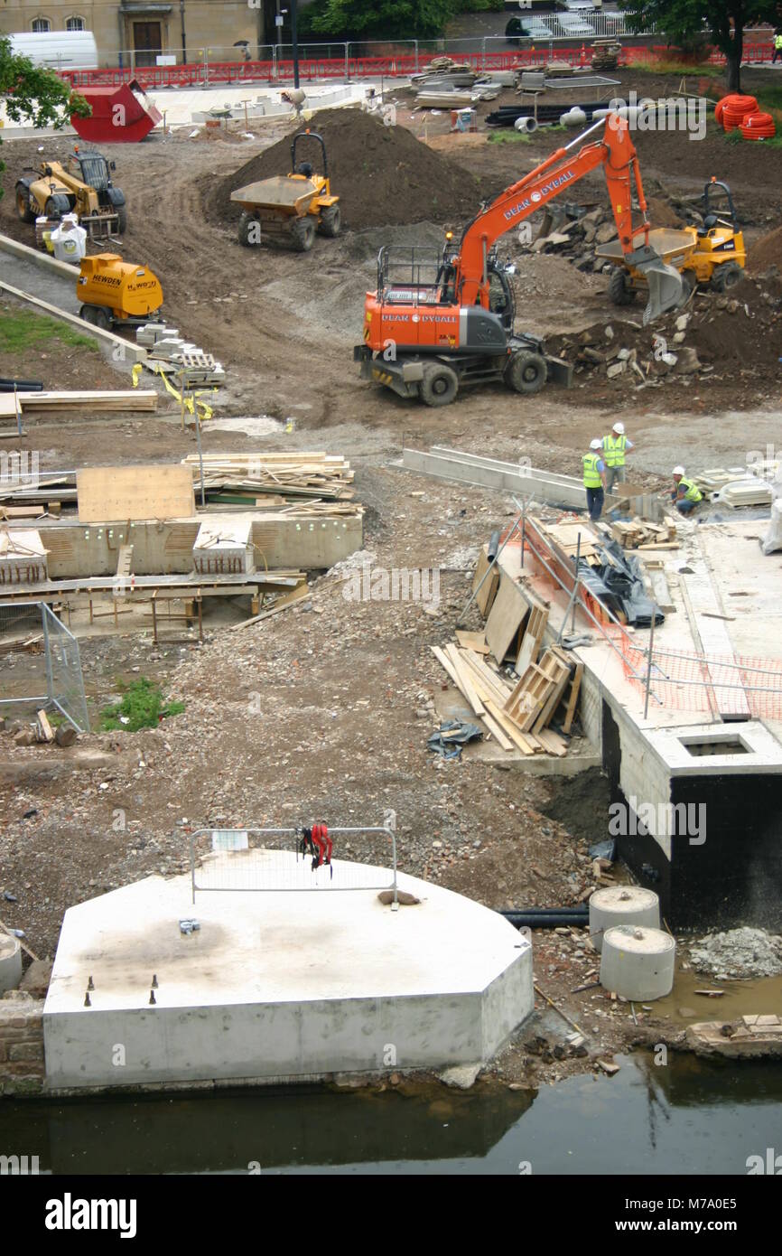 Construction site with crane and workmen Stock Photo - Alamy