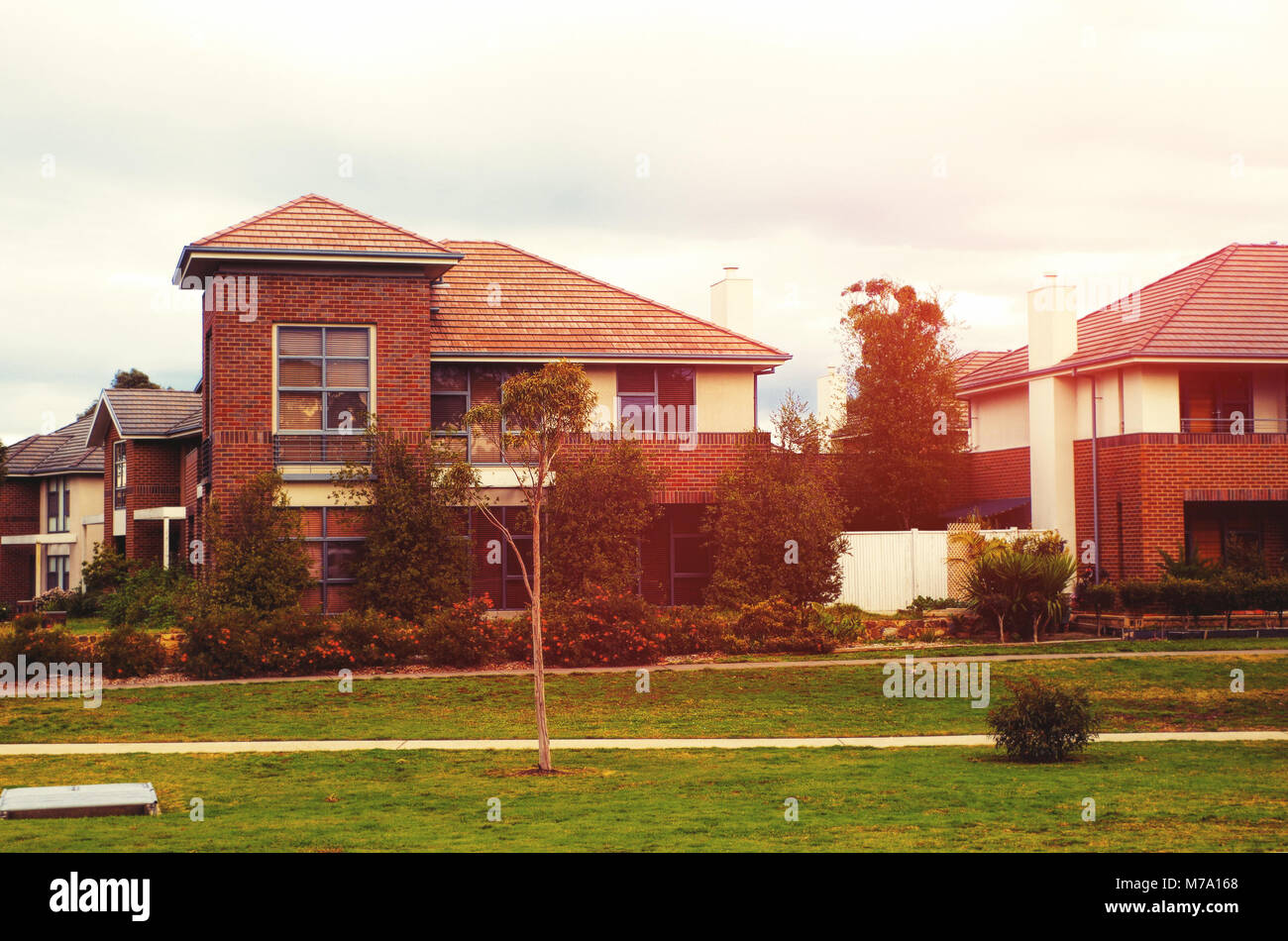 Residential houses in the sunset Stock Photo - Alamy