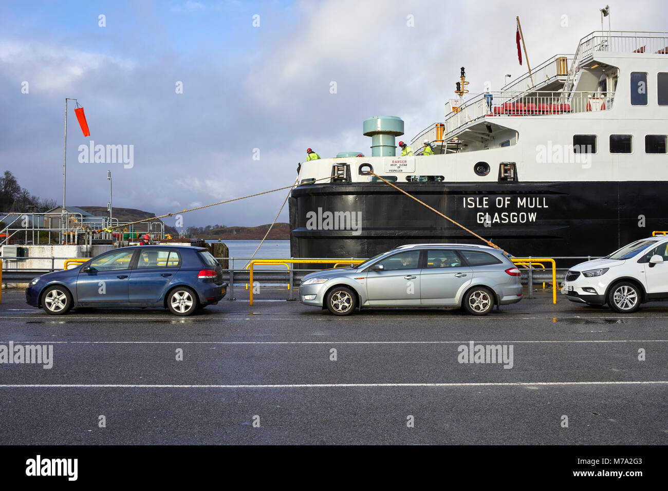 Caledonian MacBrayne ferry, "Isle of Mull" approaches, and ties up at ...