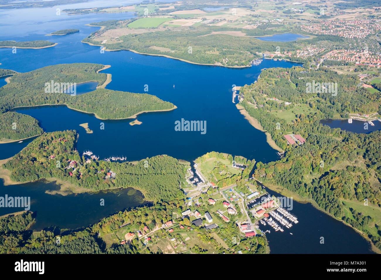 Aerial autumnal view of marina located on Tajty Lake in Gizycko, Mazury ...
