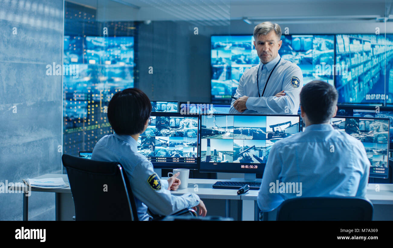 In the Security Control Room Chief Surveillance Officer Holds a ...