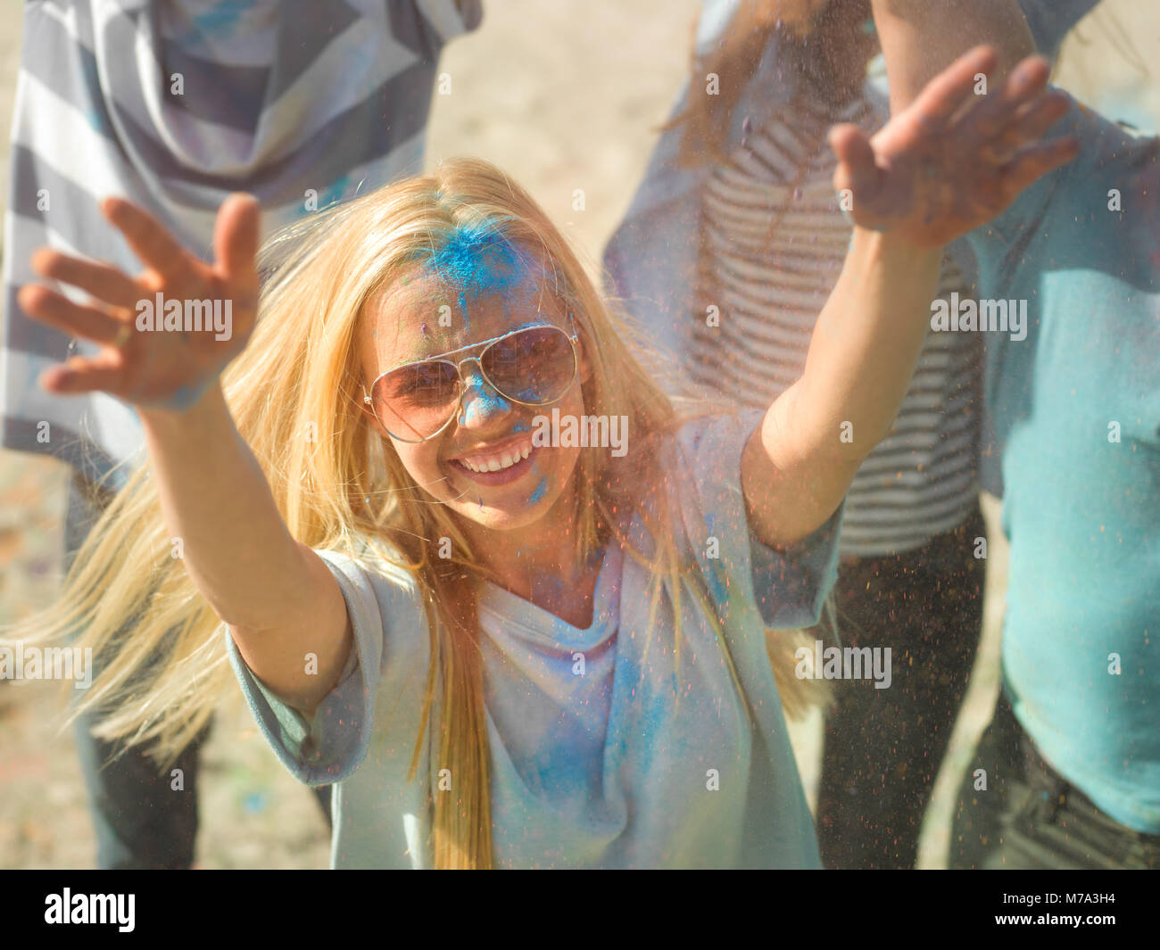 Throwing color powder hi-res stock photography and images - Alamy