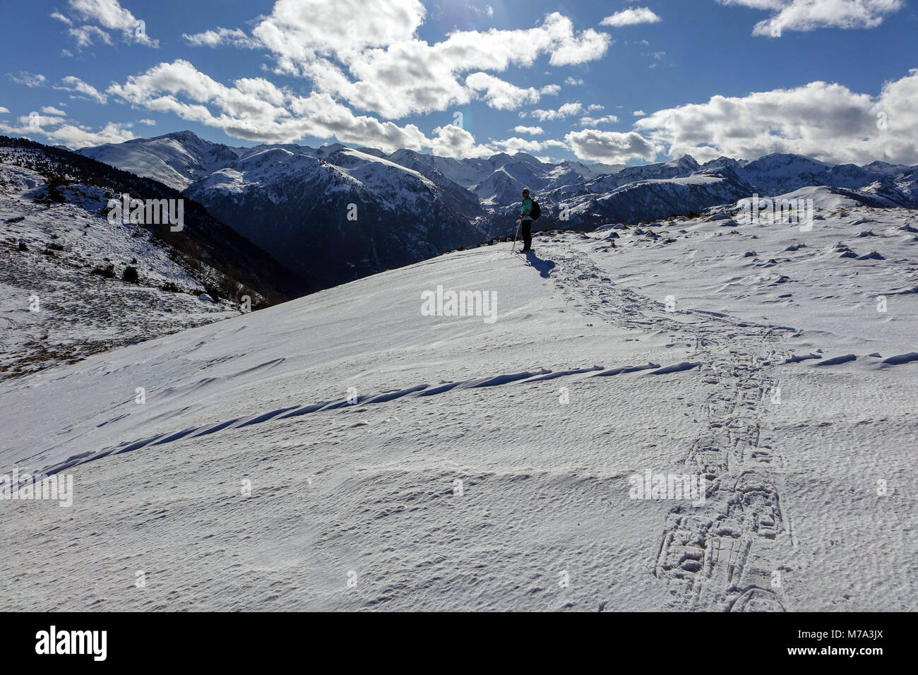 Female Snow Shoeing Plateau De Beille In French Pyrenees France
