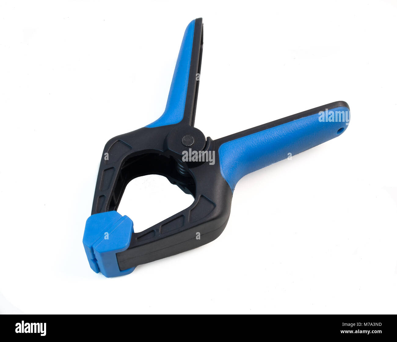Plastic clamp tool on white background with blue handles Stock Photo ...