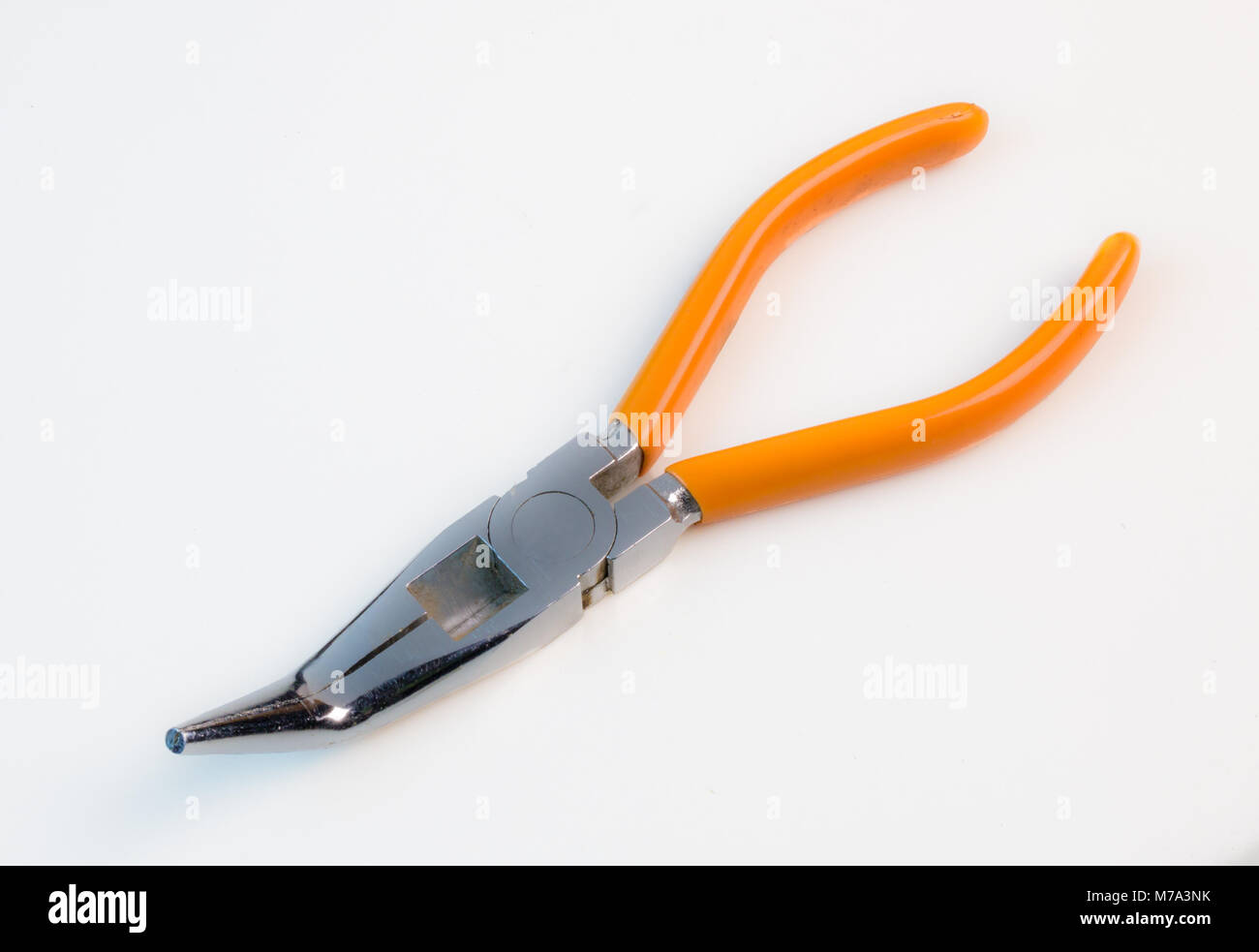 Bent long nose pliers on white background with orange handles Stock ...