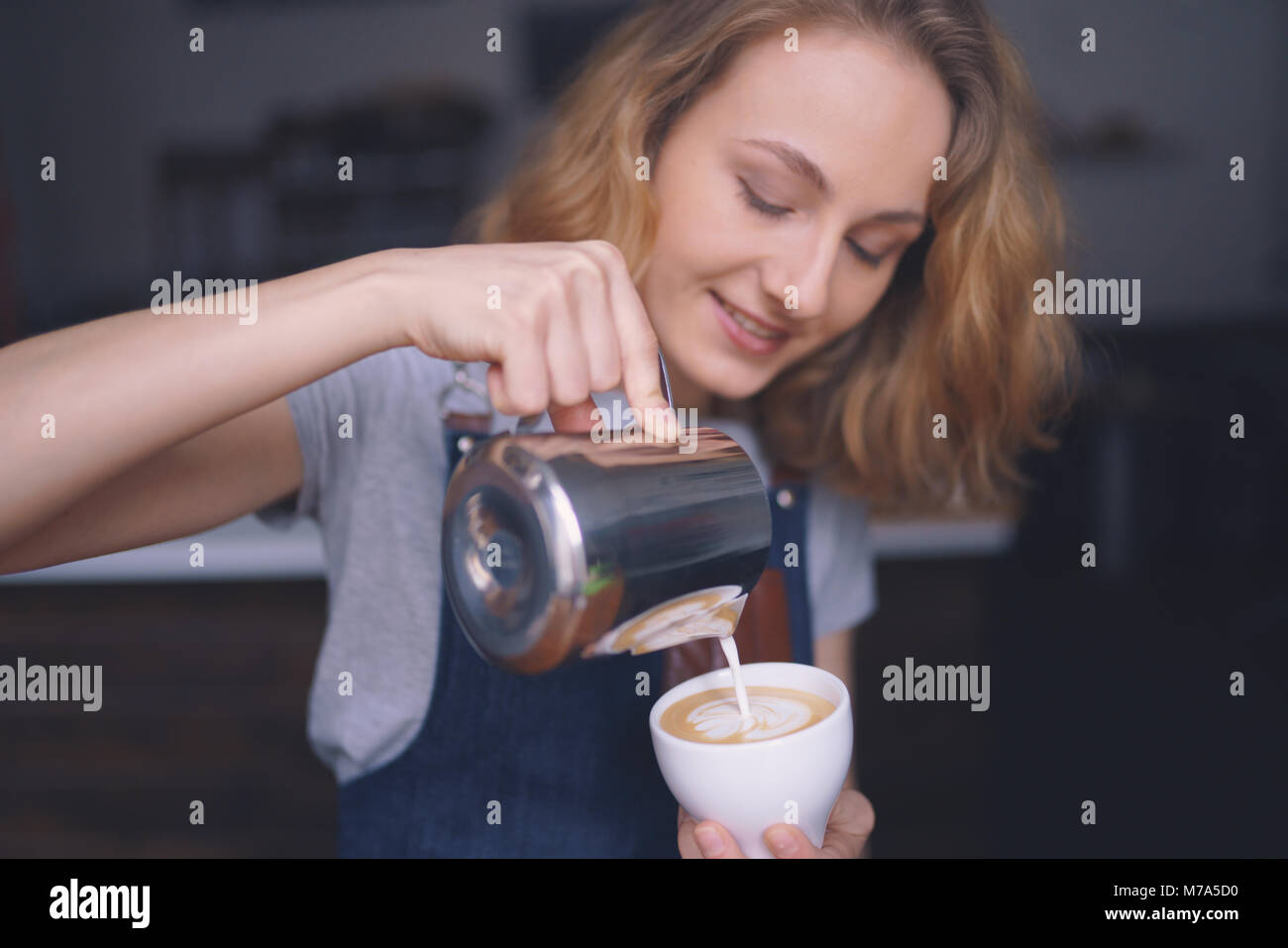 beautiful girl making coffee (cappuccino Stock Photo - Alamy