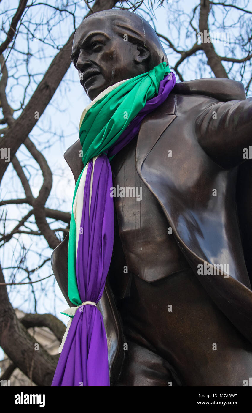 The David Lloyd George statue in Parliament Square is draped in the ...