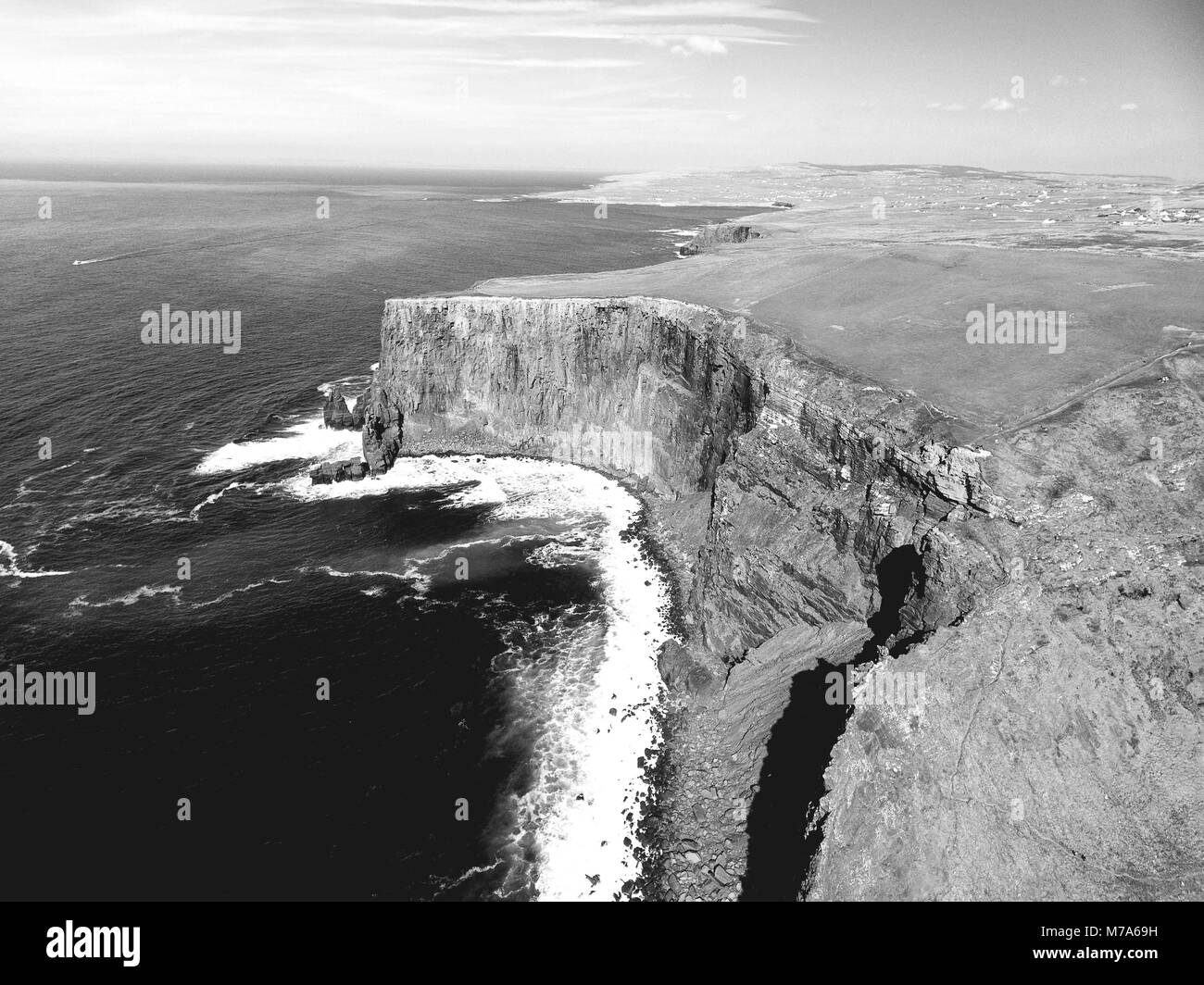 black and white landscape photograph from the cliffs of moher in county ...