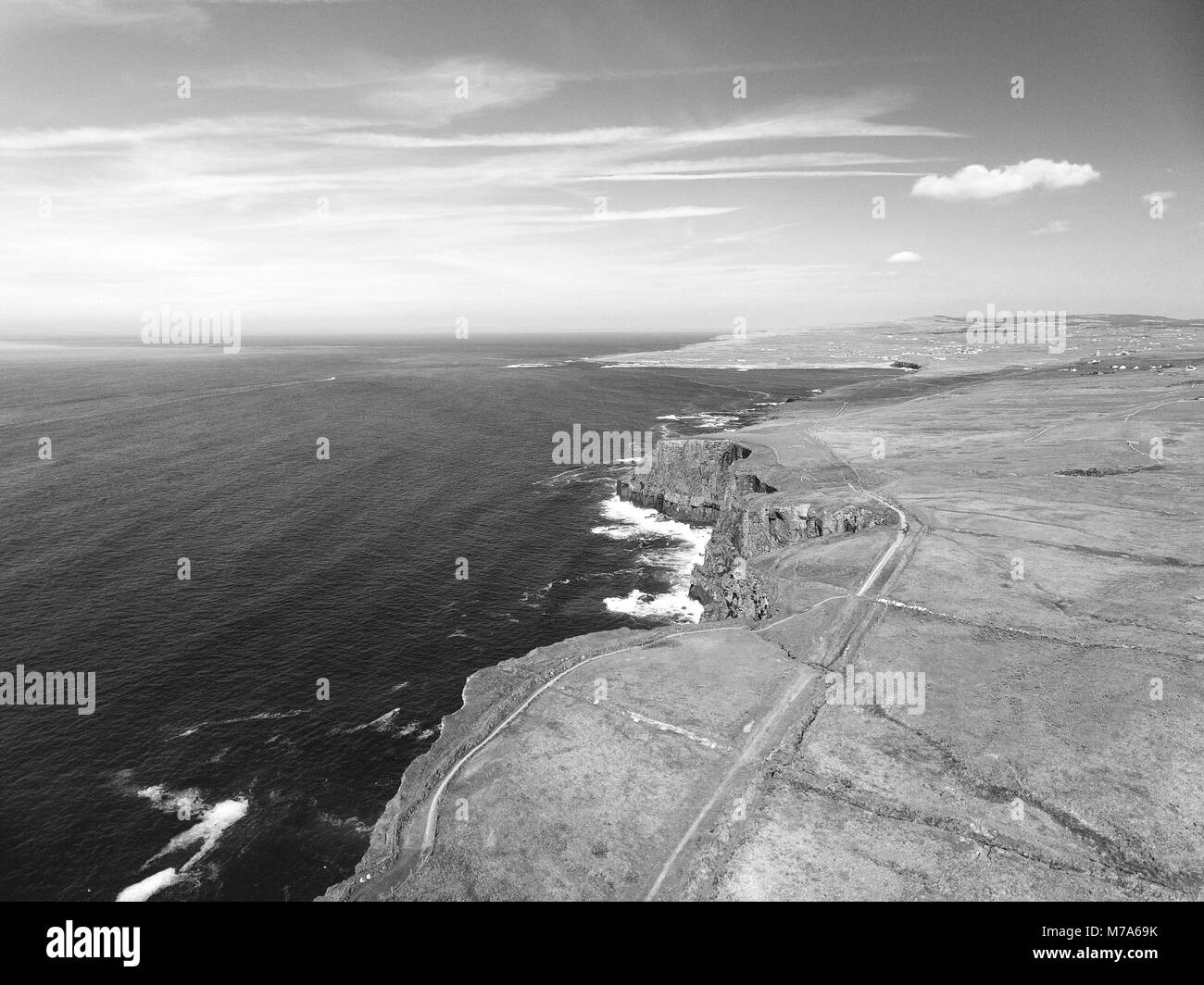 black and white landscape photograph from the cliffs of moher in county ...