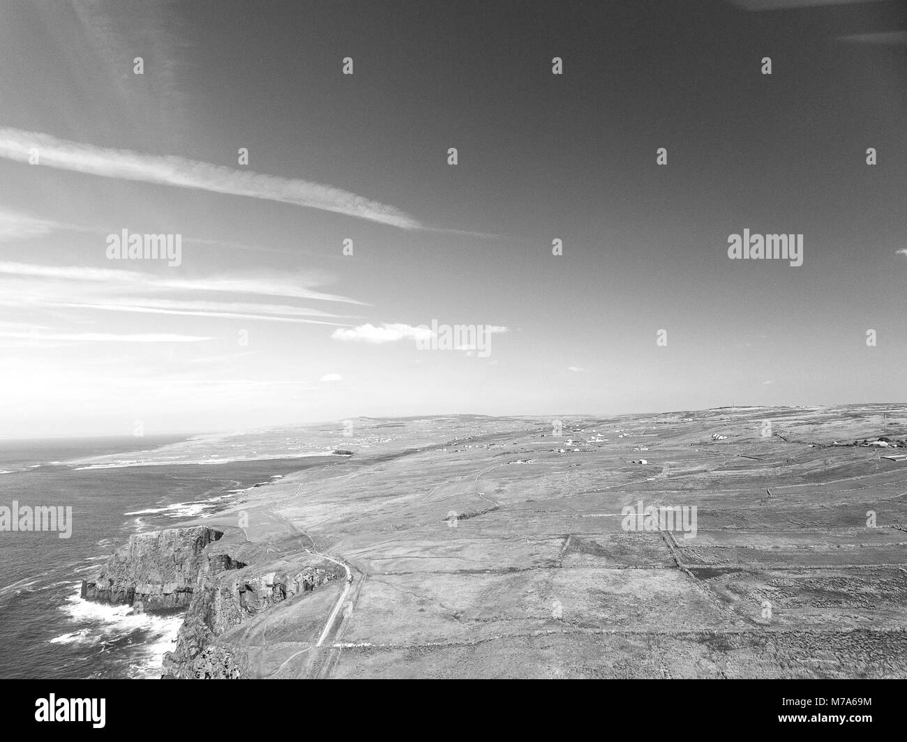 black and white landscape photograph from the cliffs of moher in county ...