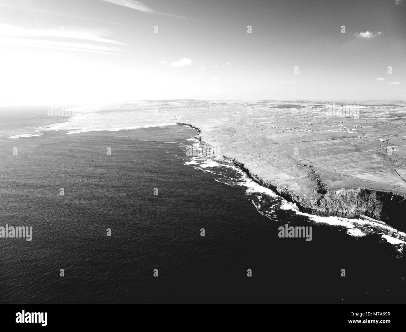 black and white landscape photograph from the cliffs of moher in county ...