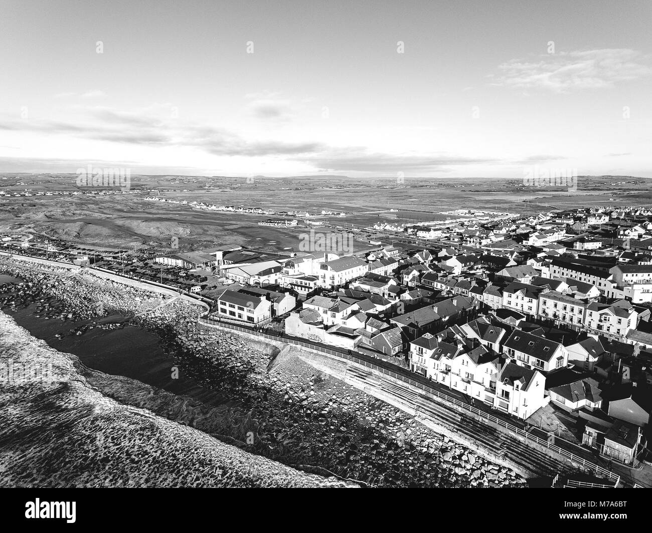 Aerial view of Ireland's top surfing town and beach in Ireland. Lahinch ...
