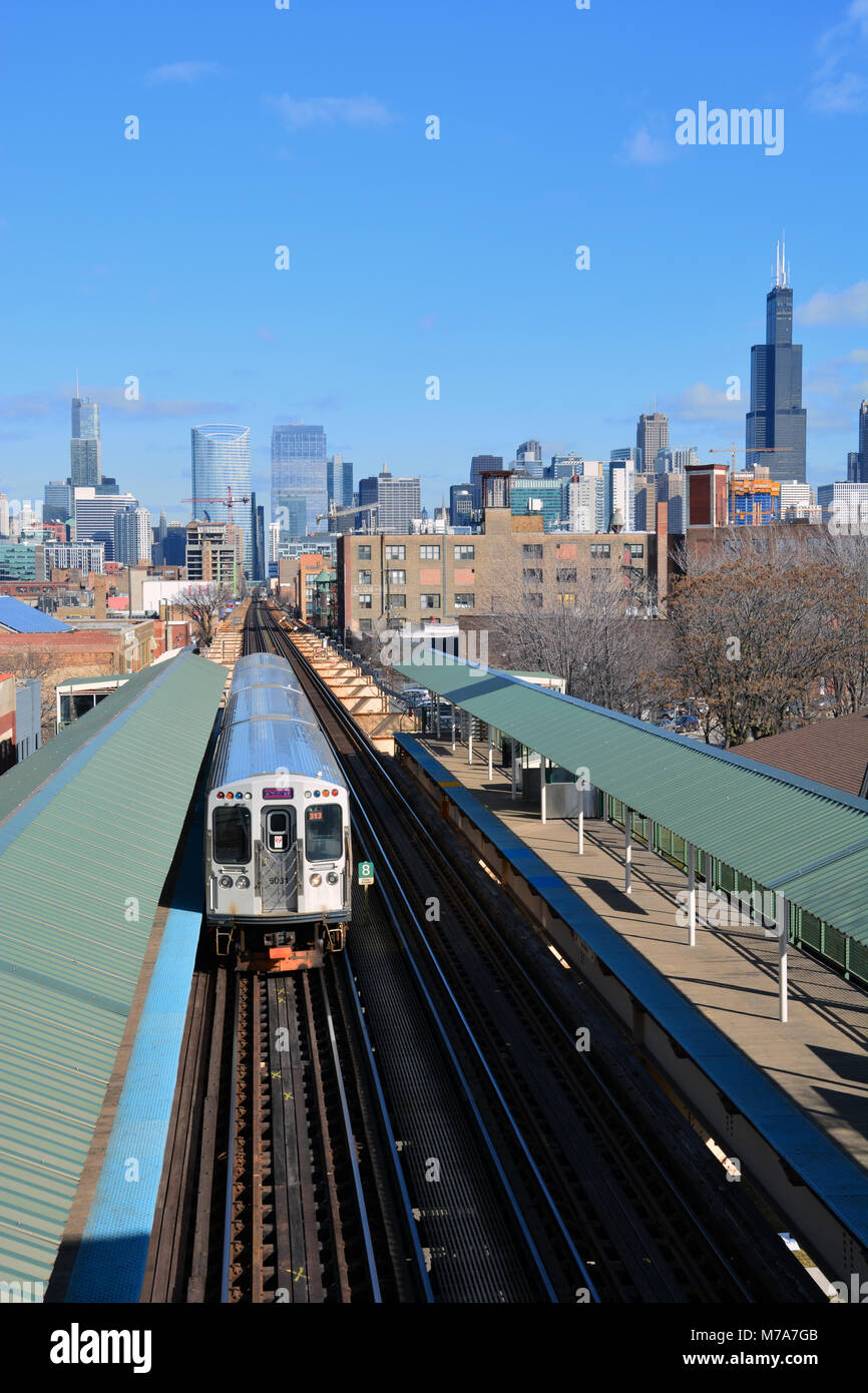 A Pink Line train heading west on the Lake St. elevated tracks at the ...
