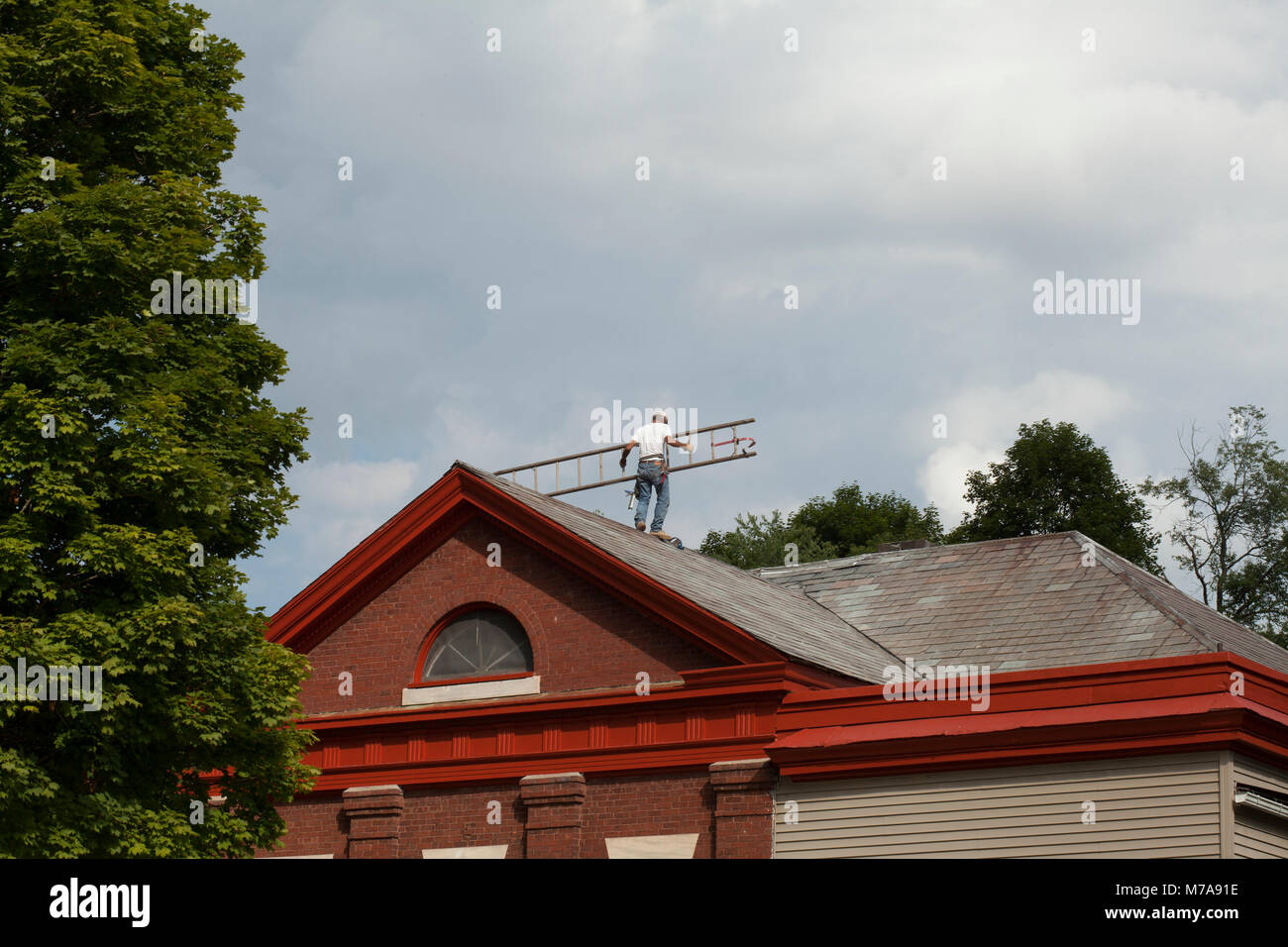 Old man up ladder hi-res stock photography and images - Alamy