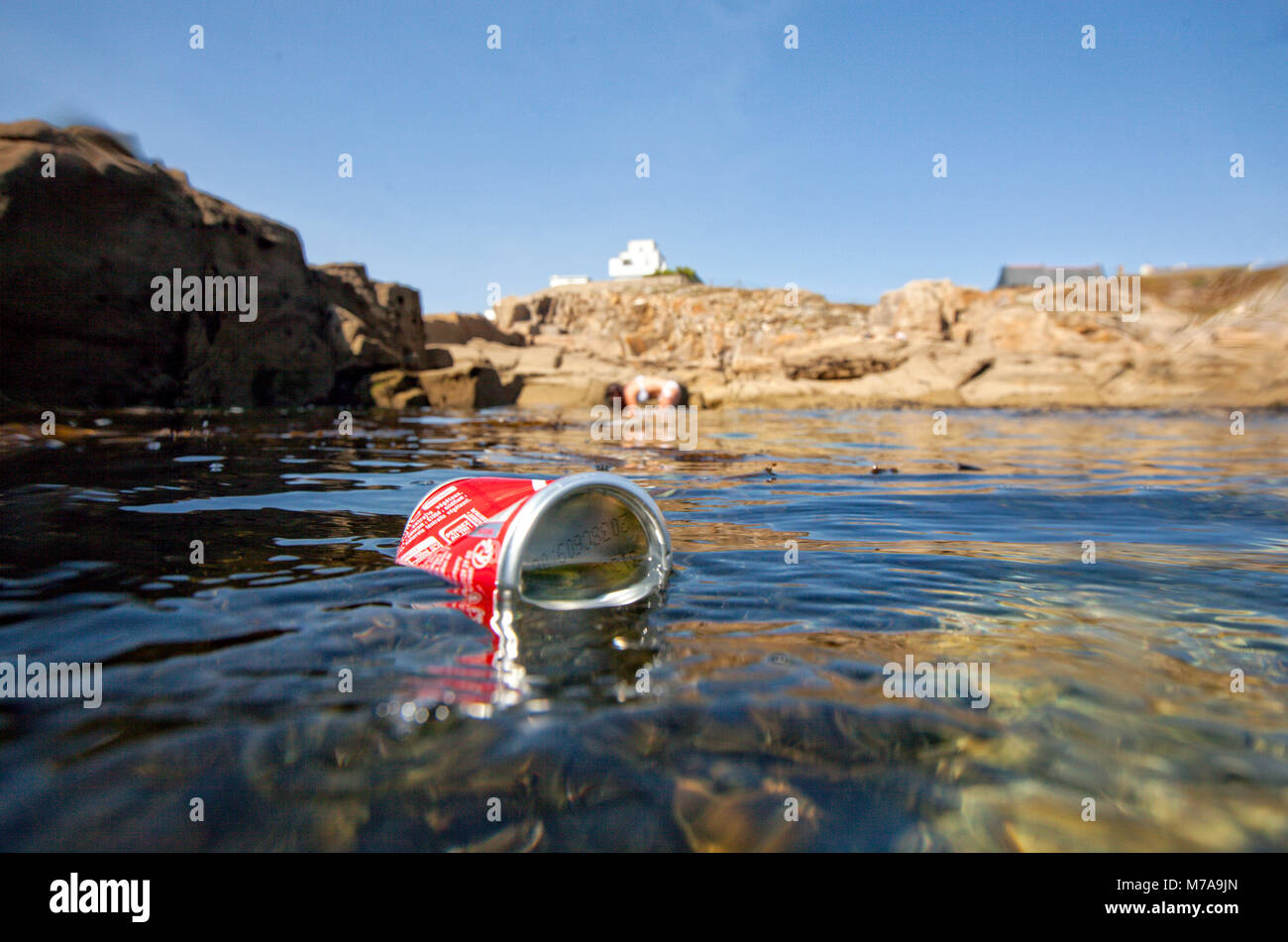 Trash floating on the Brittany shore line,Le Courégant, France. Water ...