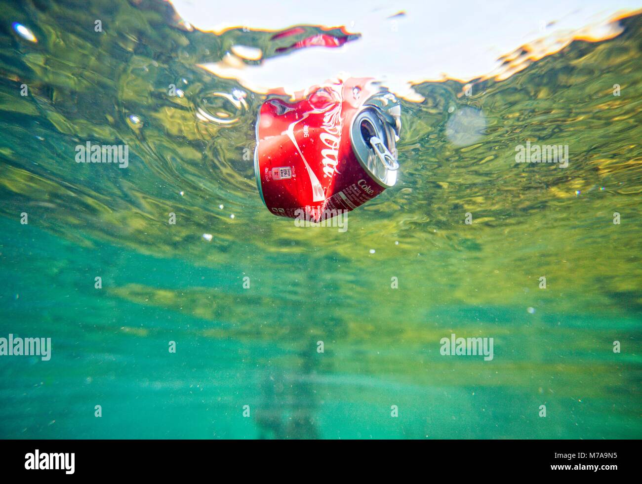 Trash floating on the Brittany shore line,Le Courégant, France. Water ...