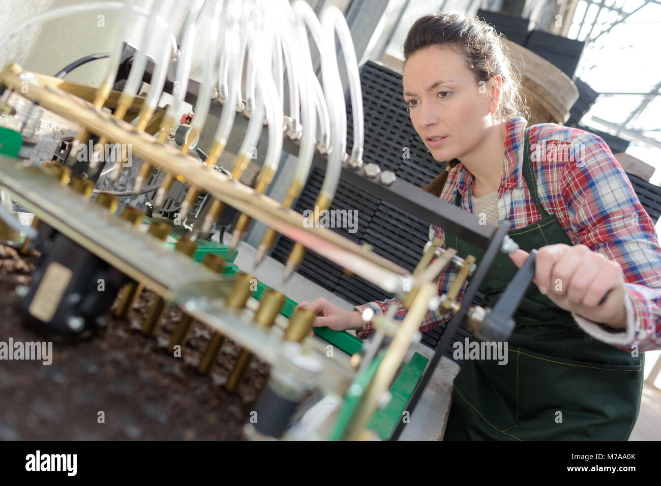 Operating industrial machine hi-res stock photography and images - Alamy