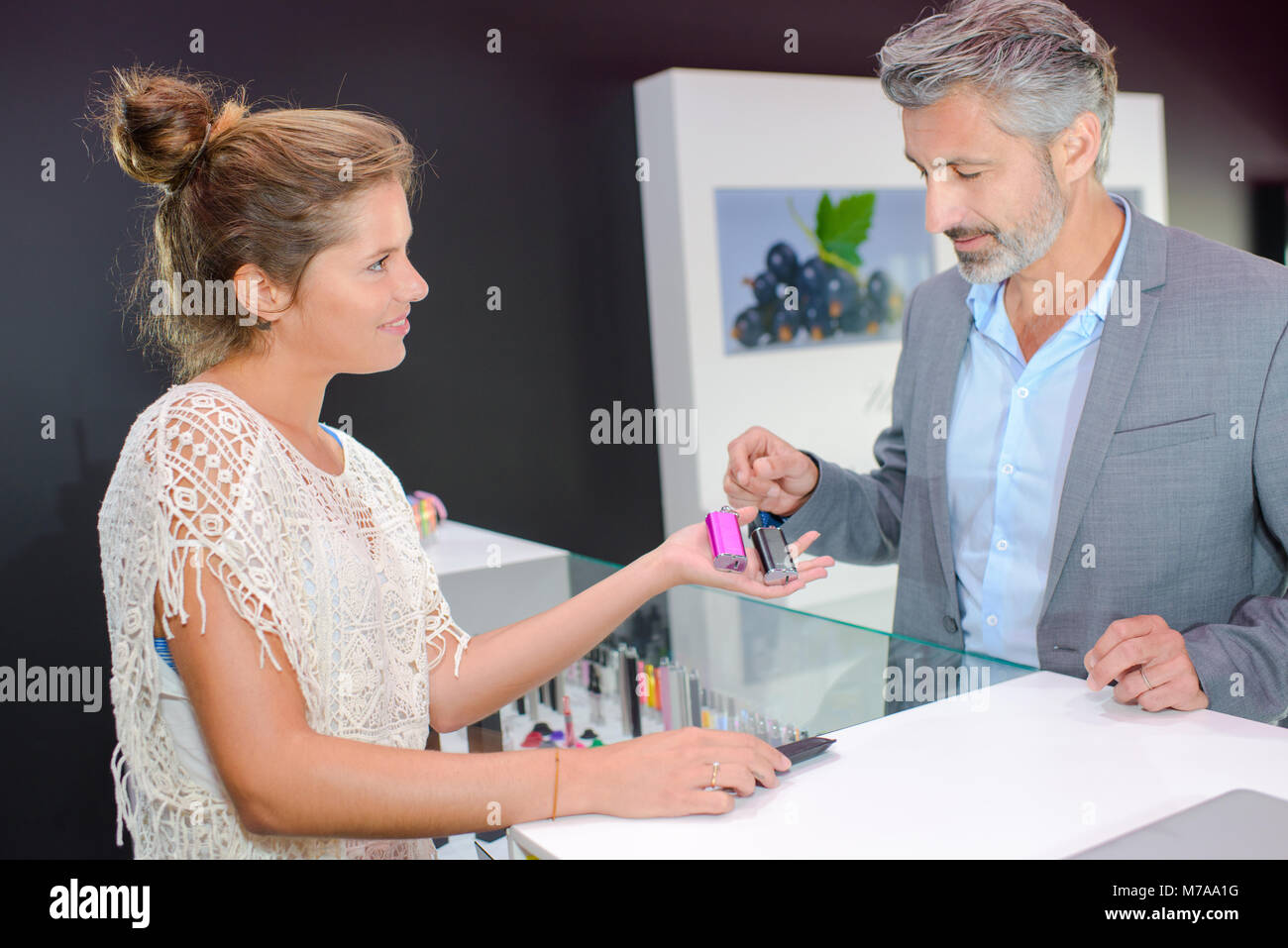 Customer choosing between two products Stock Photo - Alamy