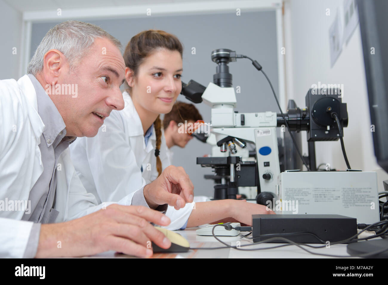 happy teacher and laboratory students Stock Photo - Alamy