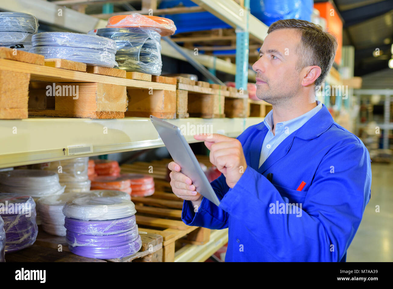 material clerk doing his work Stock Photo - Alamy