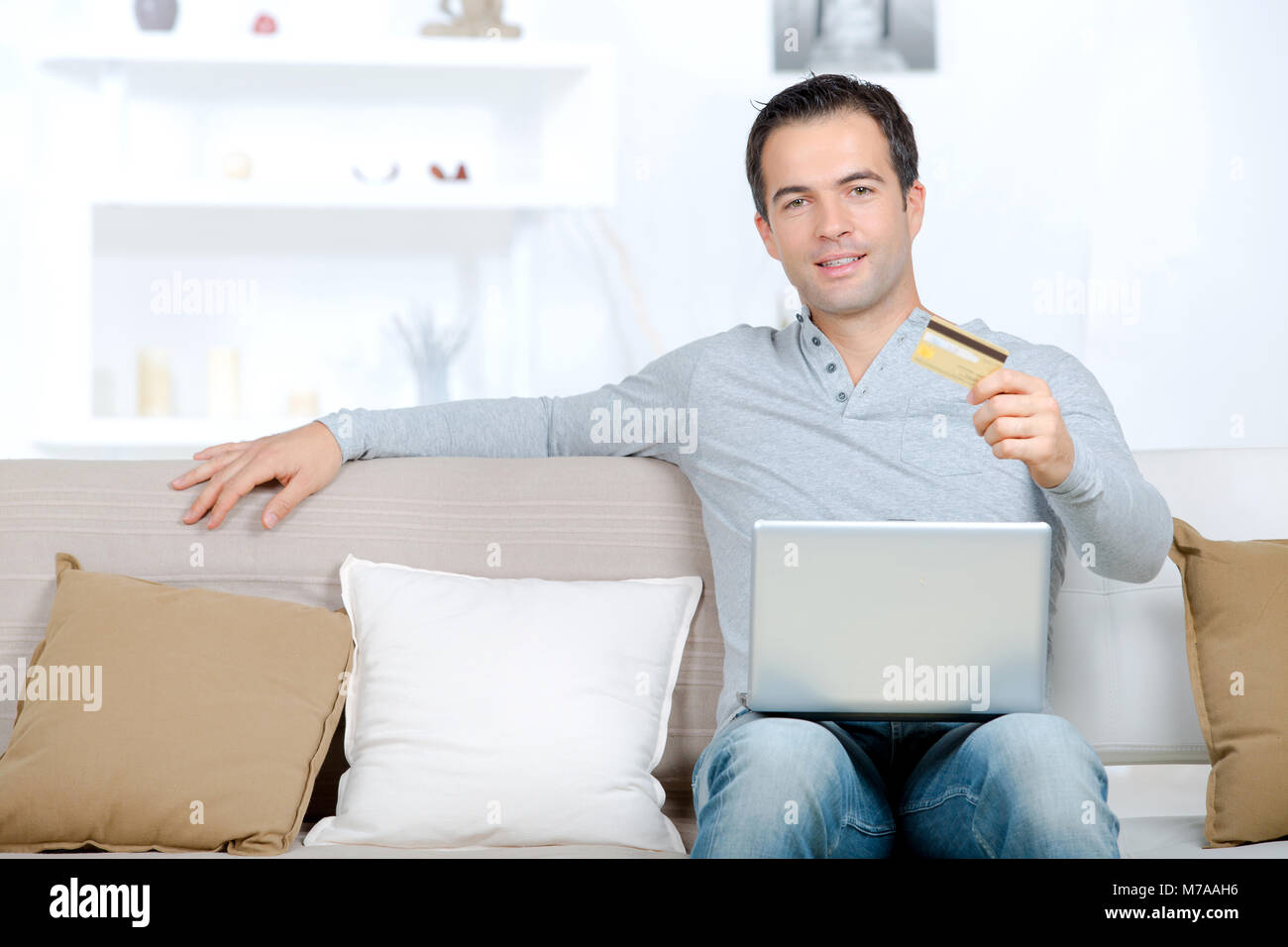man showing his bank card Stock Photo - Alamy