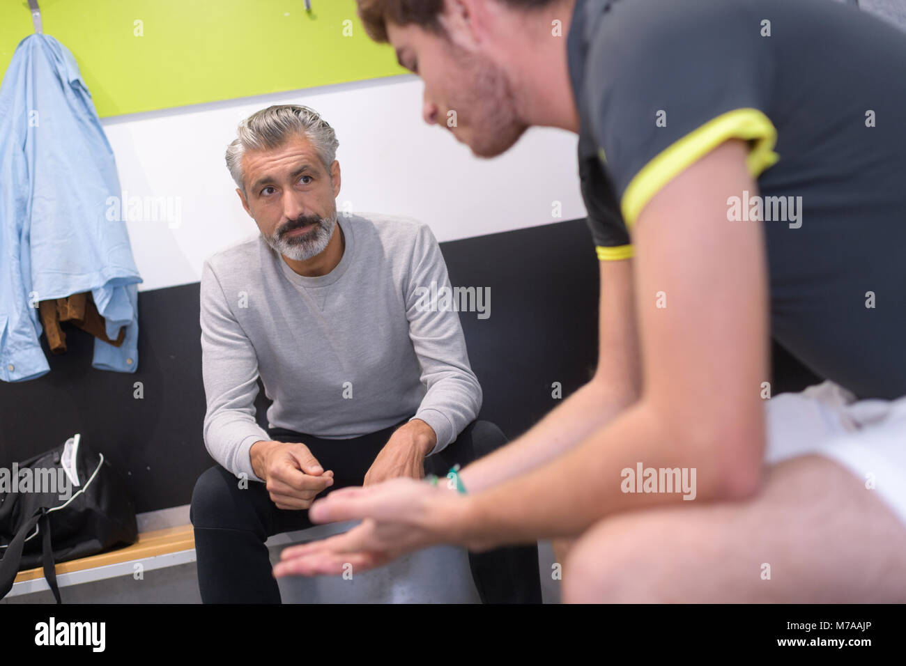 Father son football coach hi-res stock photography and images - Alamy