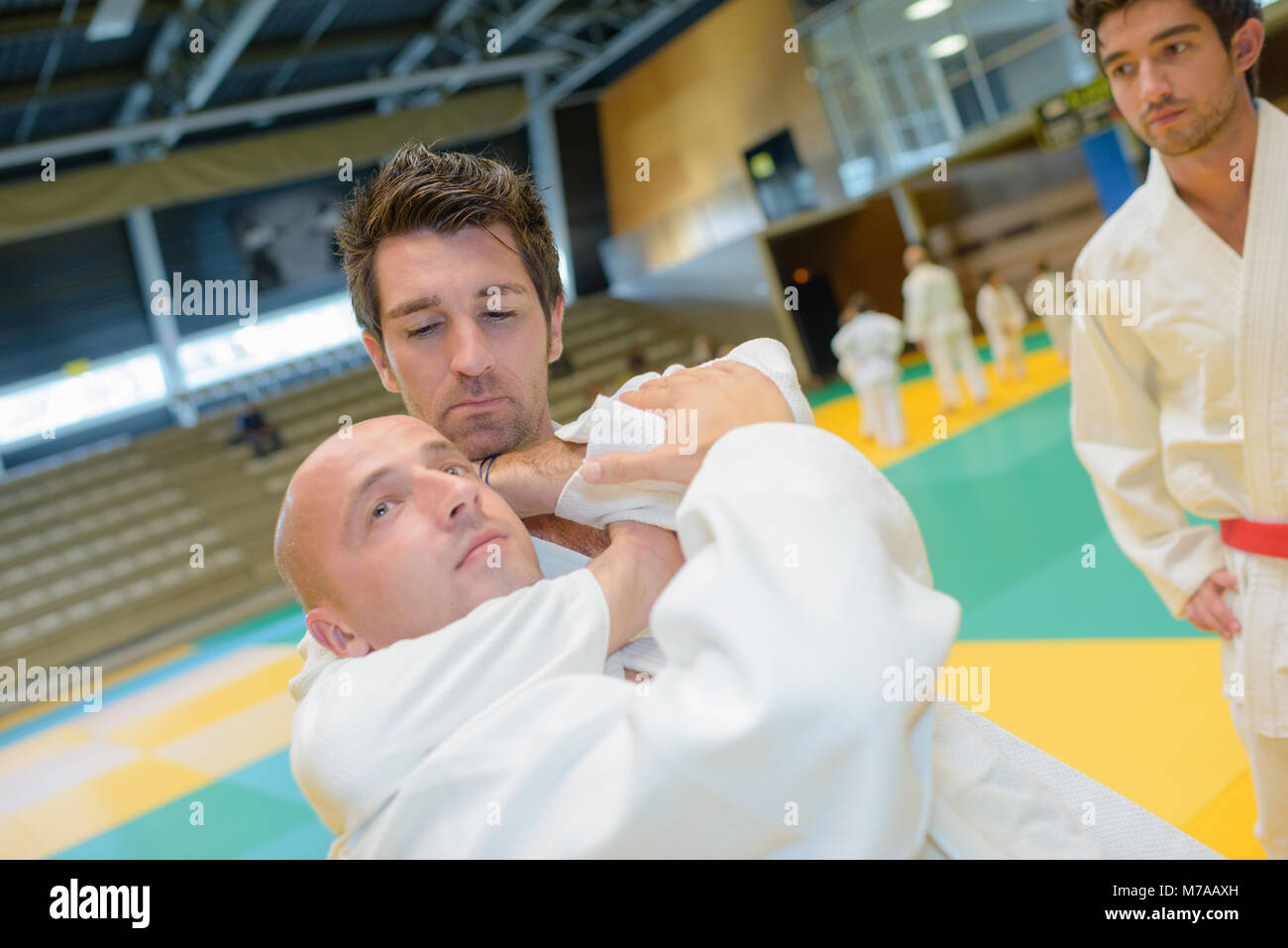 fighters judoists fight in competition on judo Stock Photo - Alamy