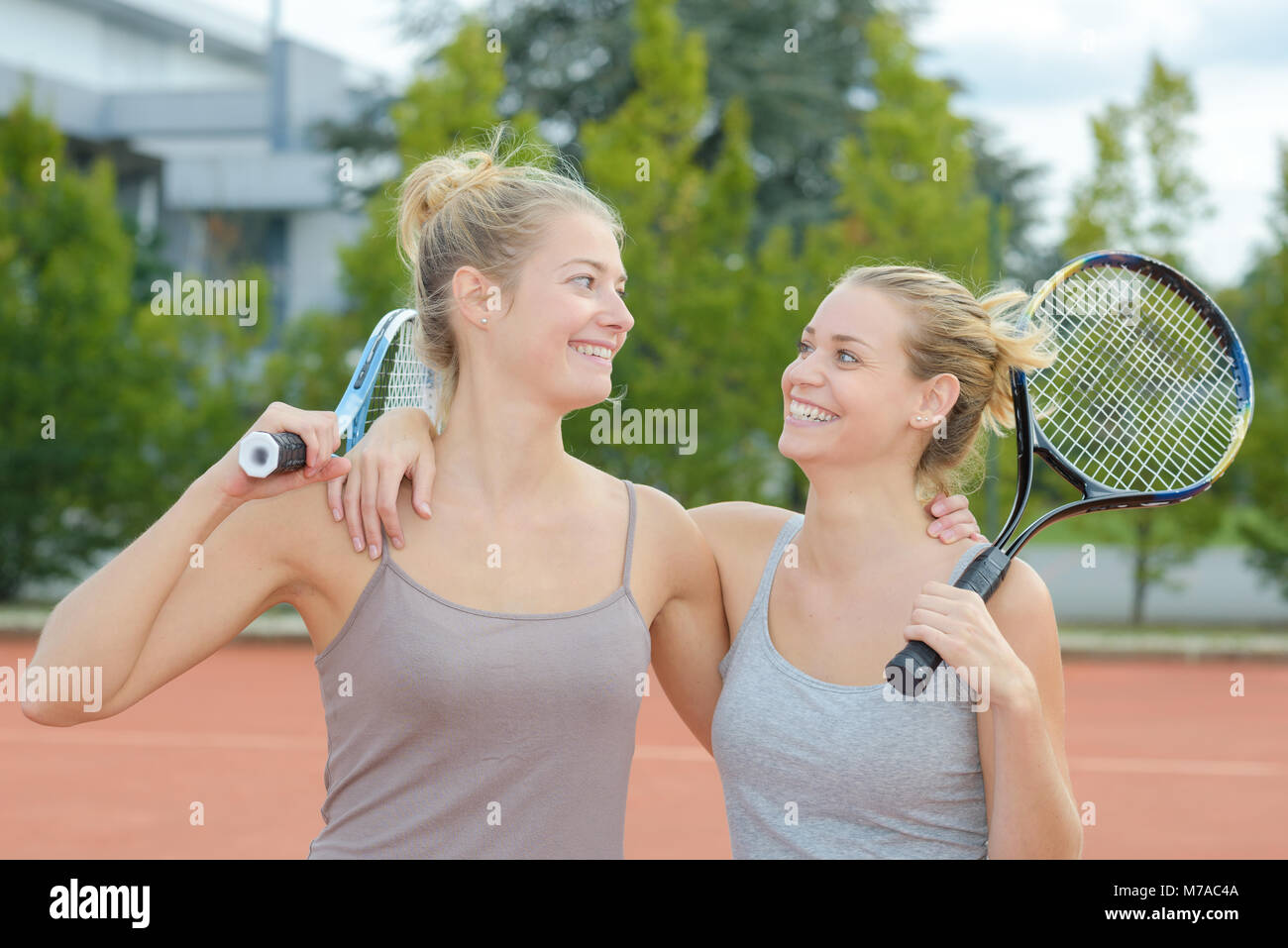 friends playing tennis Stock Photo - Alamy