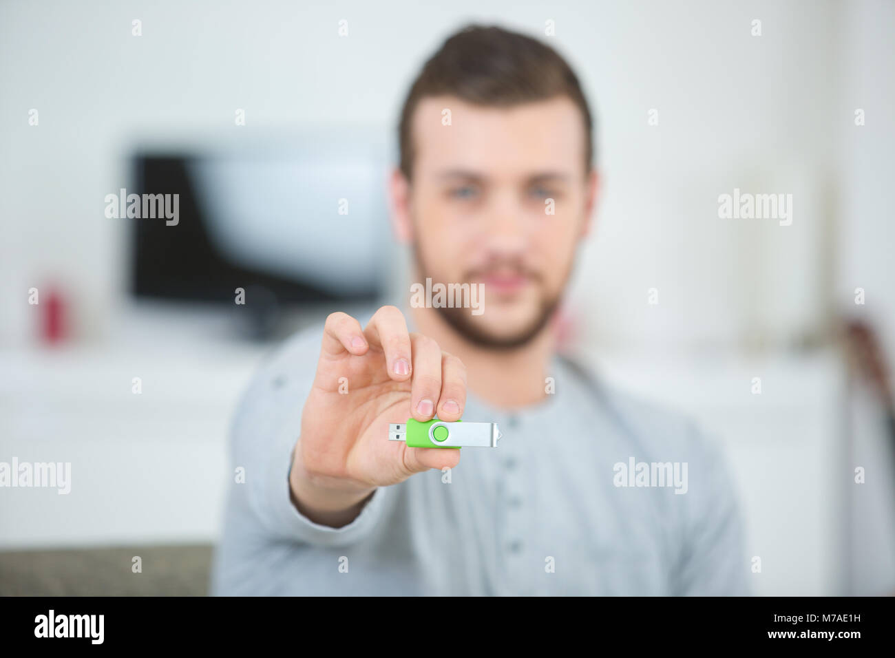man holding usb card Stock Photo - Alamy