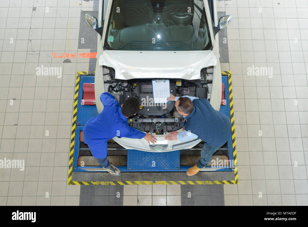 top-view of a car being repaired at a garage Stock Photo - Alamy