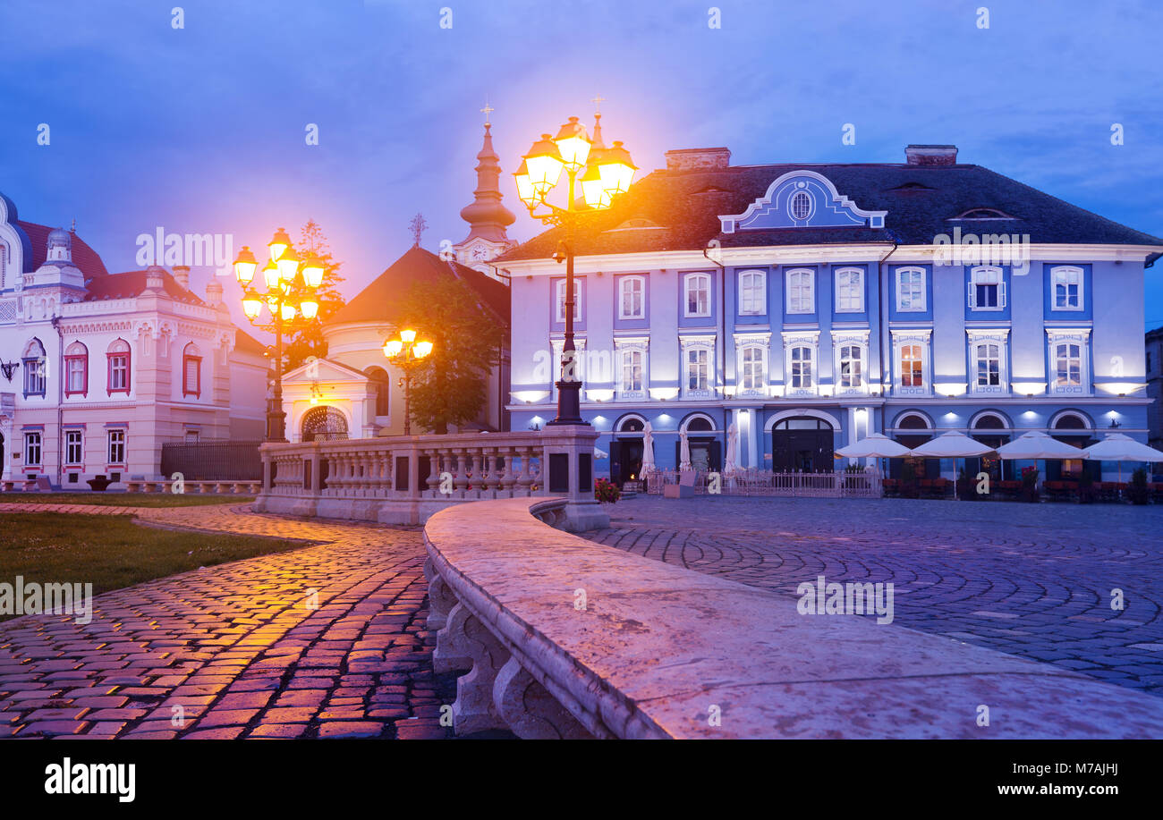 Illuminated Unirii Square in Timisoara in dusk, Romania Stock Photo - Alamy
