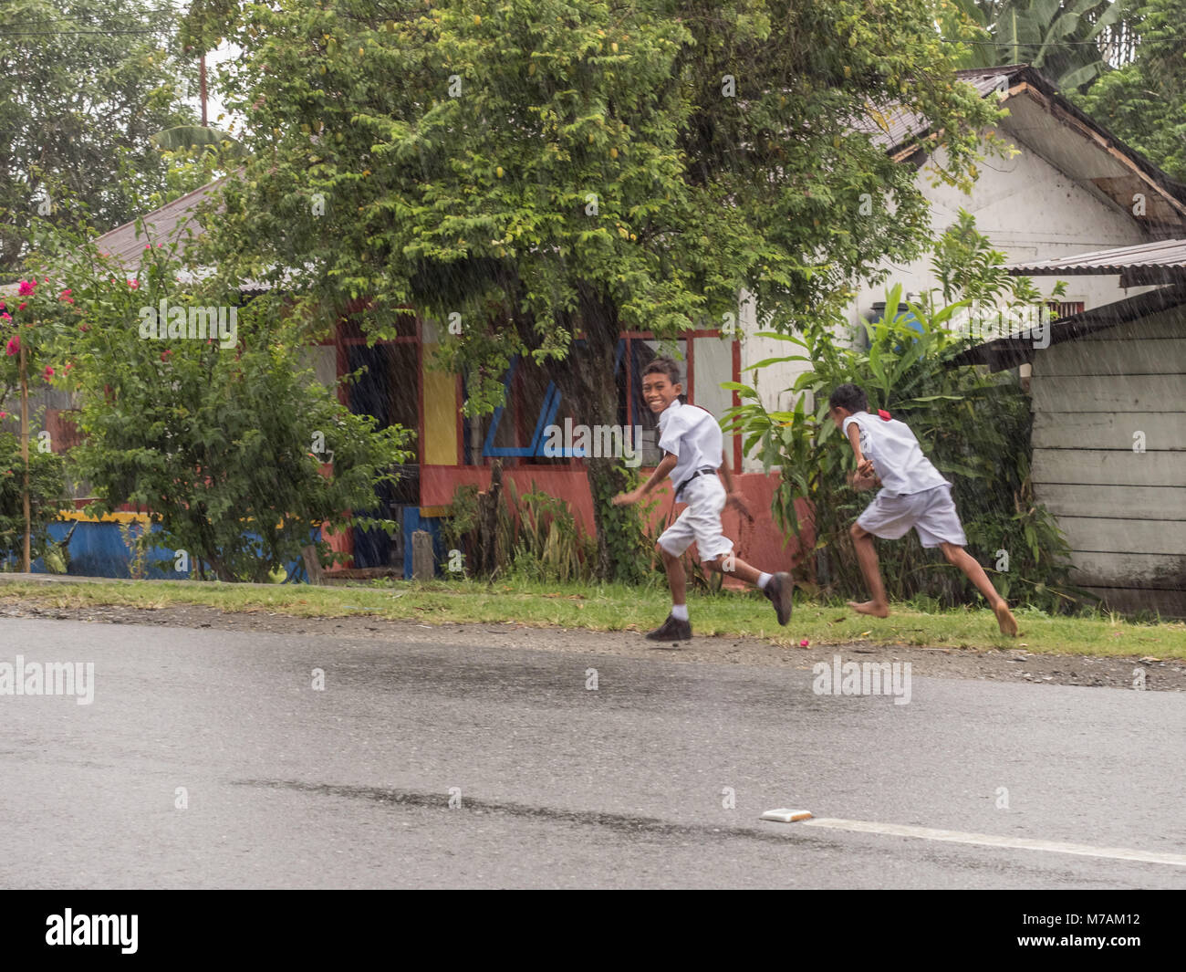 Ambon, Indonesia - February 12, 2018: Children in the white uniforms ...