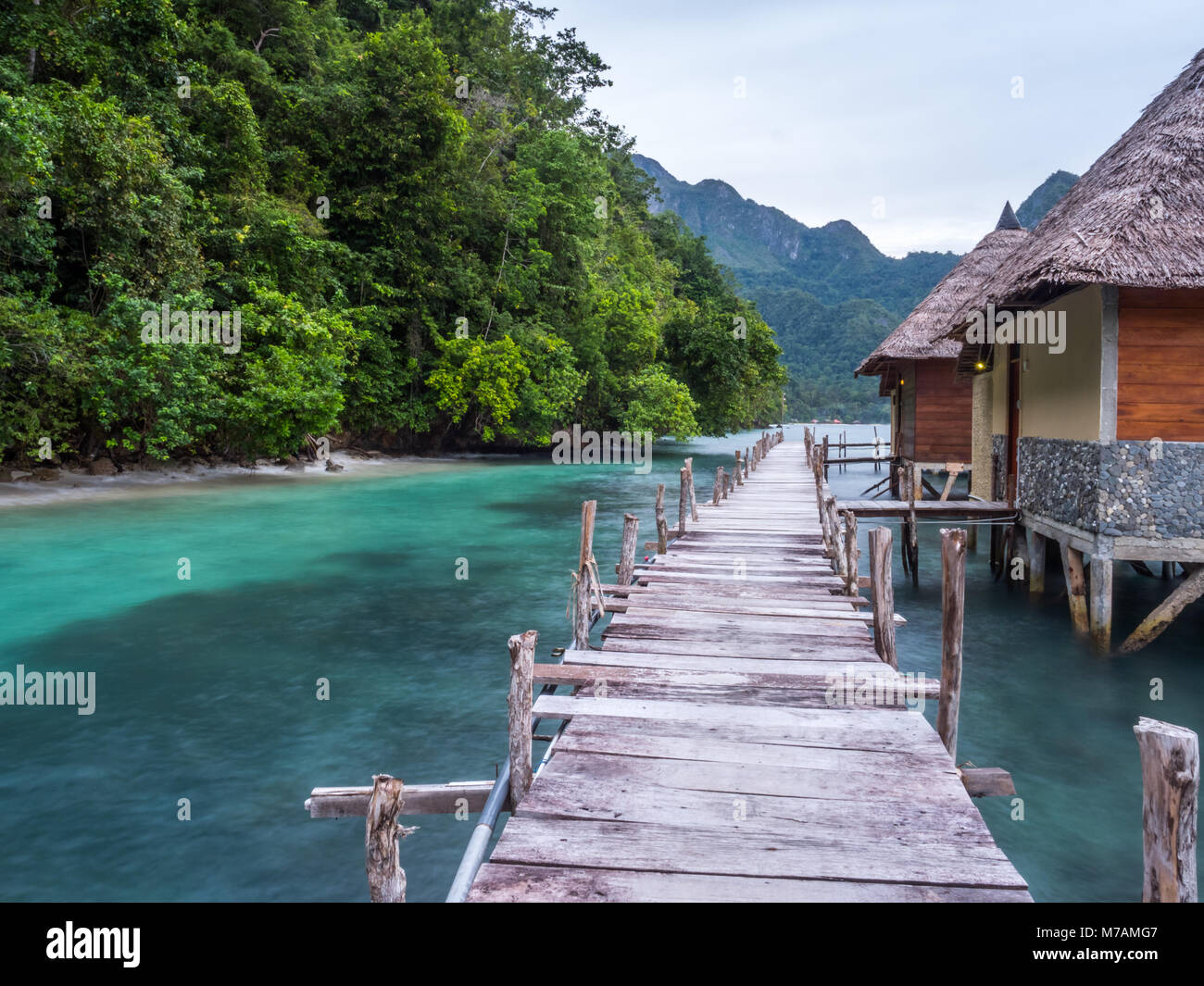 Ora Beach, Indonesia - February 12, 2018: Houses on the water in Ora ...