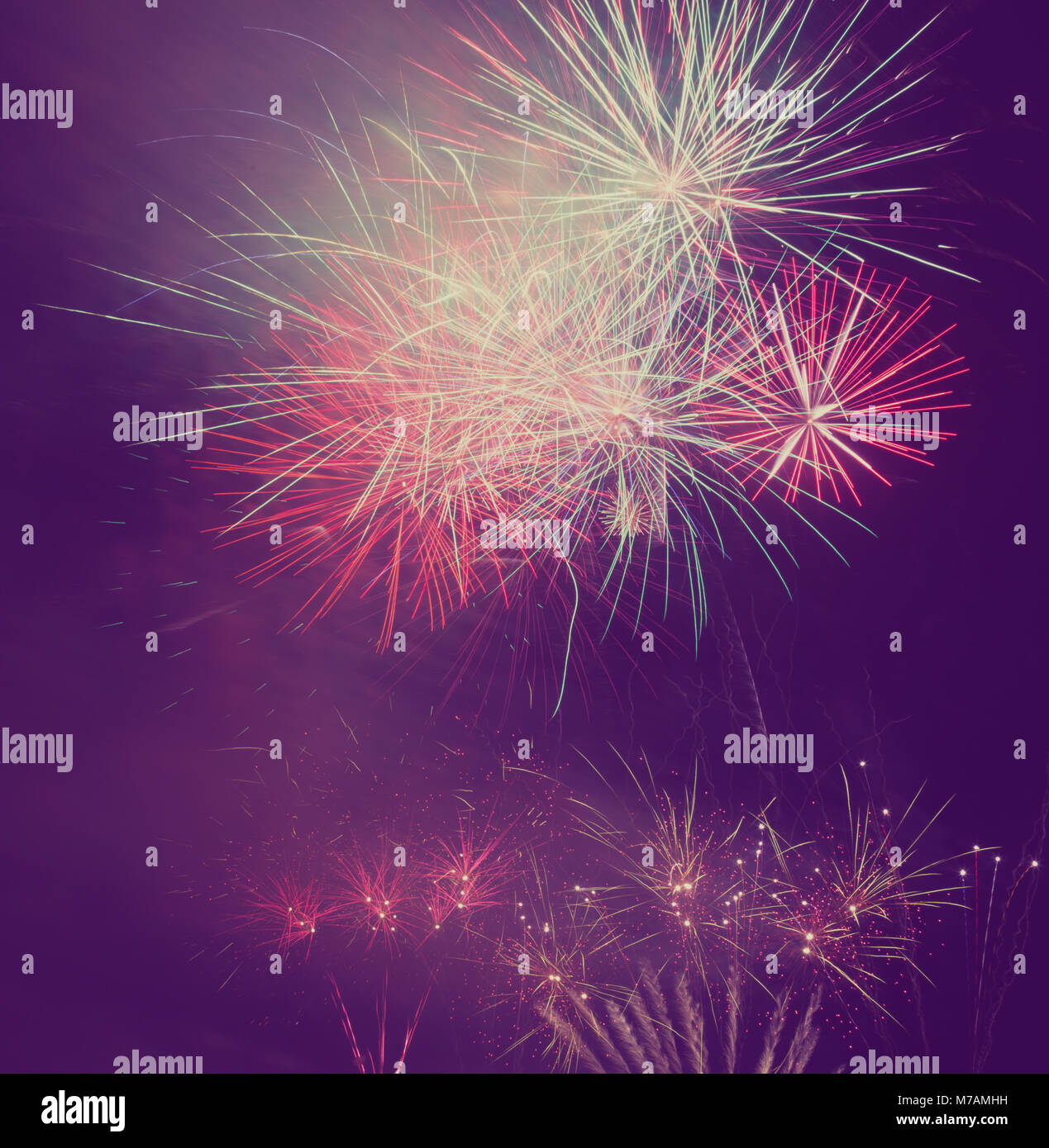 Colorful fireworks display on night sky background Stock Photo - Alamy