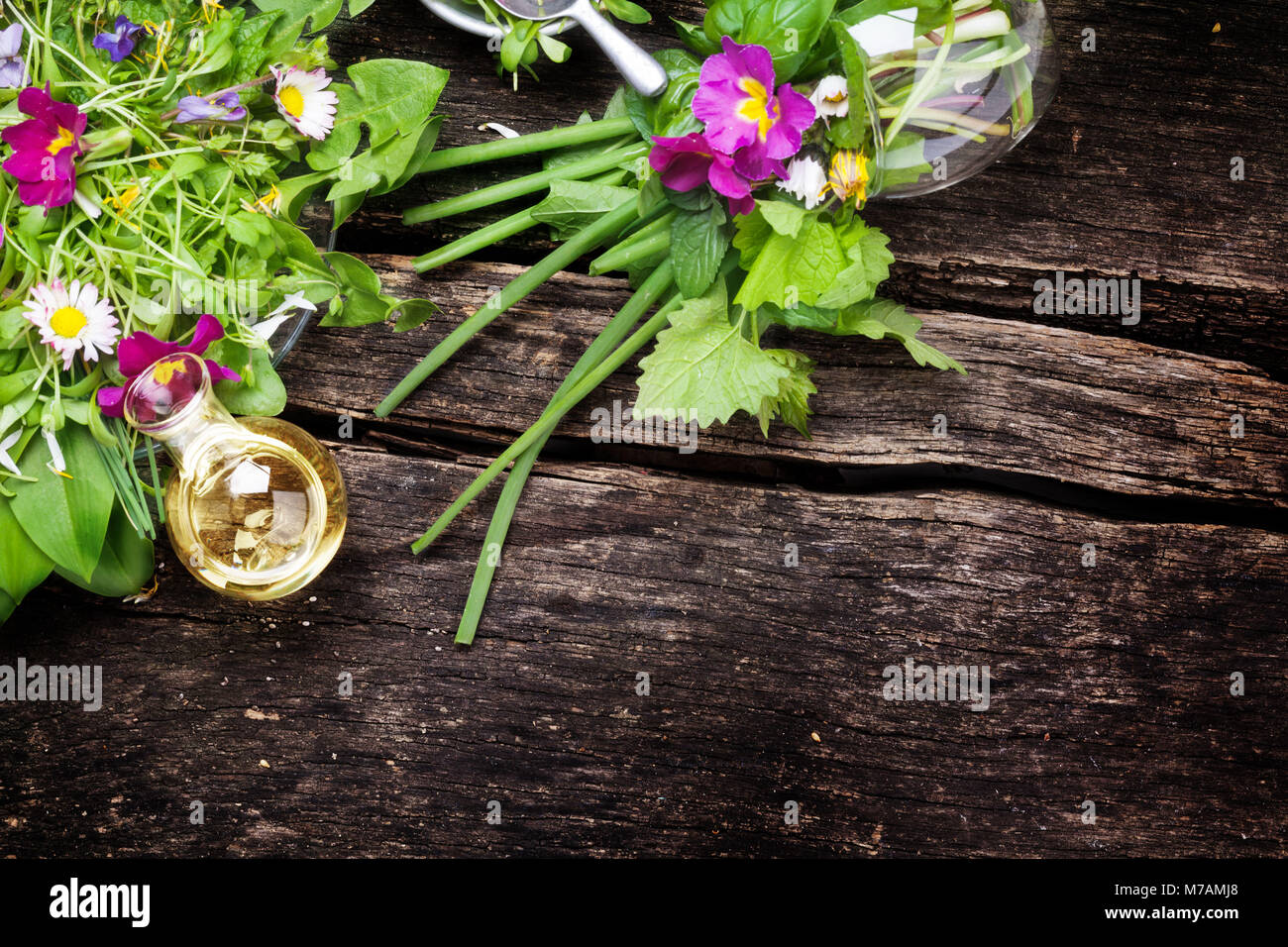 Spring salad, edible wild herbs, flowers Stock Photo - Alamy