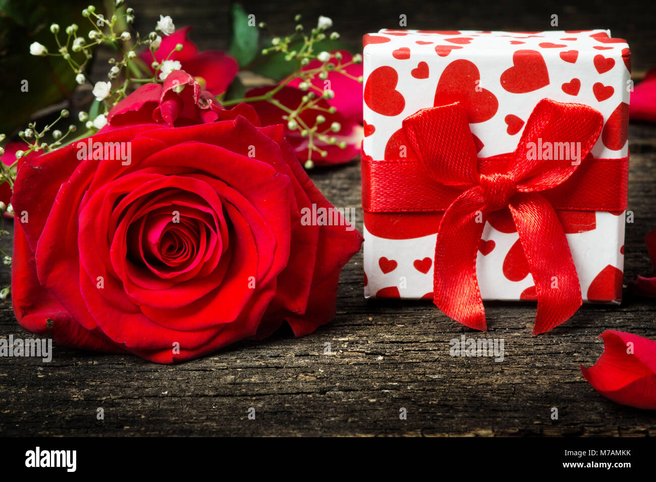 Rose and present, Valentine's Day Stock Photo - Alamy