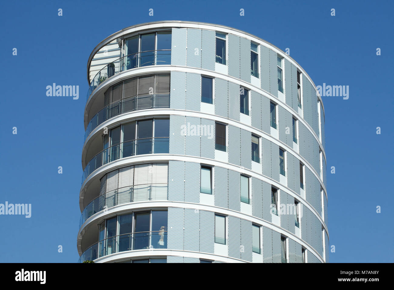 Round residential building, high rise, glass construction, harbour city ...