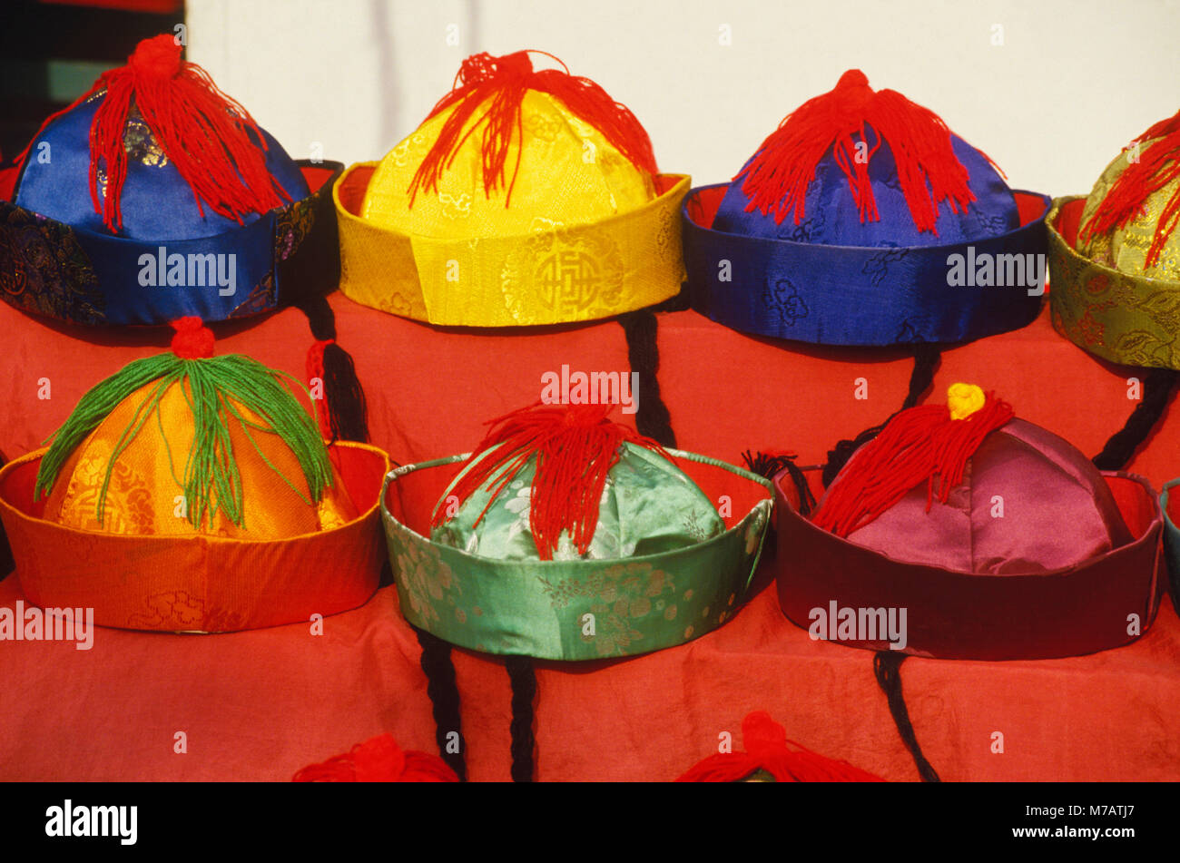 Close-up of traditional caps in a market stall, China Stock Photo - Alamy