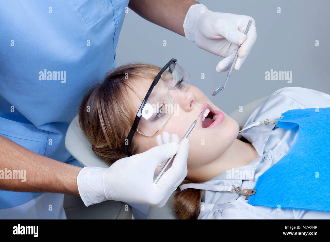 Doctor Treating Patient High Resolution Stock Photography and Images ...