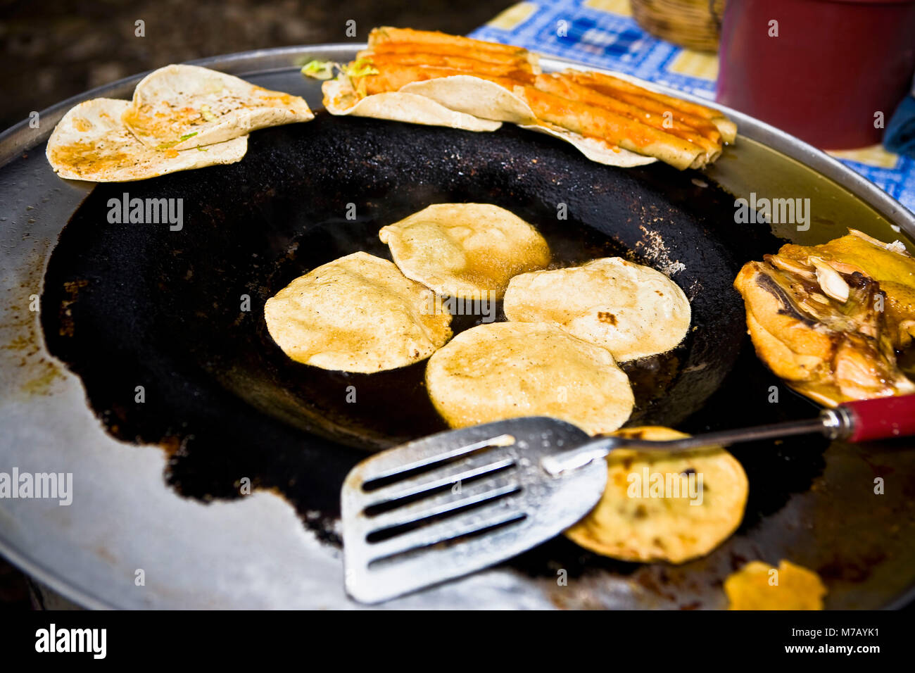 High angle view of Mexican tacos in a frying pan, Cuetzalan, Puebla ...