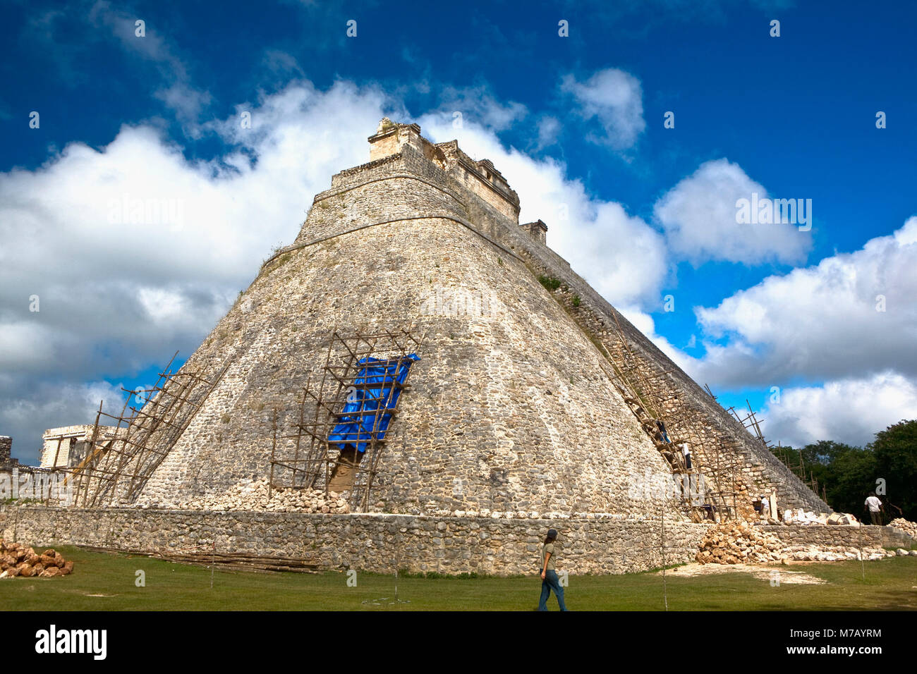 Workers restoring a pyramid, Pyramid of the Magician, Uxmal, Yucatan ...