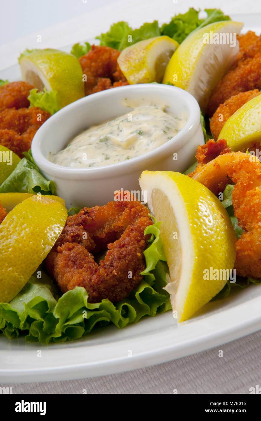 Close-up of crumb fried squid rings Stock Photo - Alamy