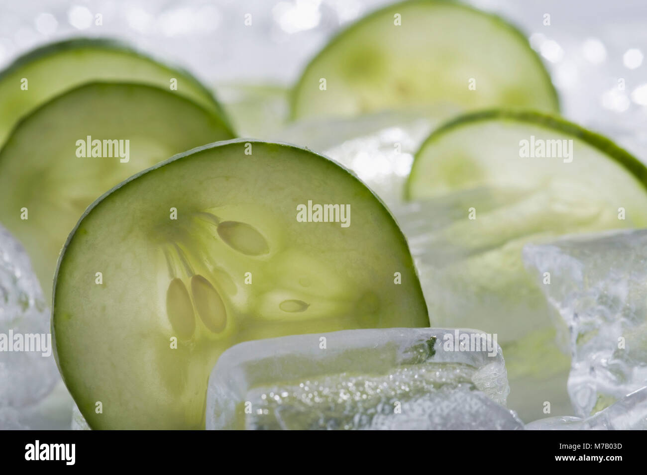 Close-up of cucumber slices on ice cubes Stock Photo - Alamy
